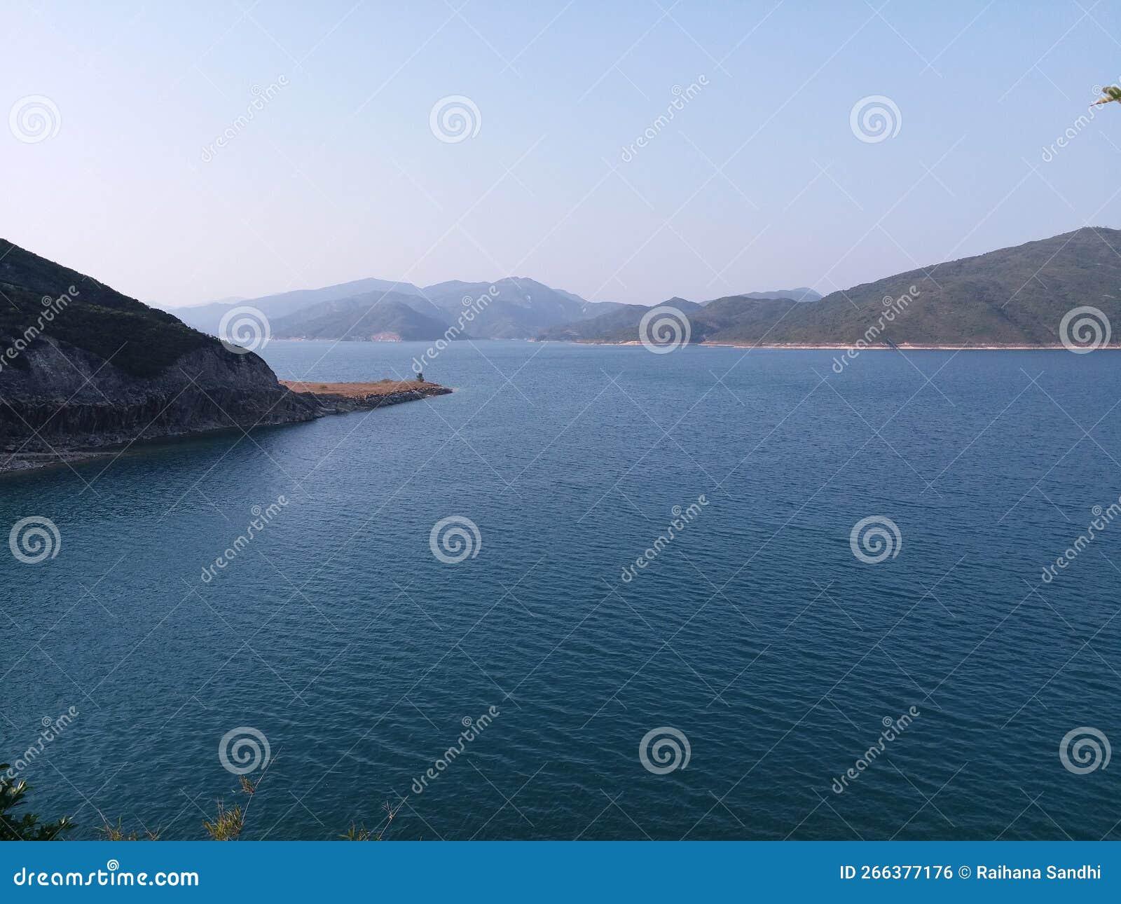 Calm sea without waves stock photo. Image of channel - 266377176