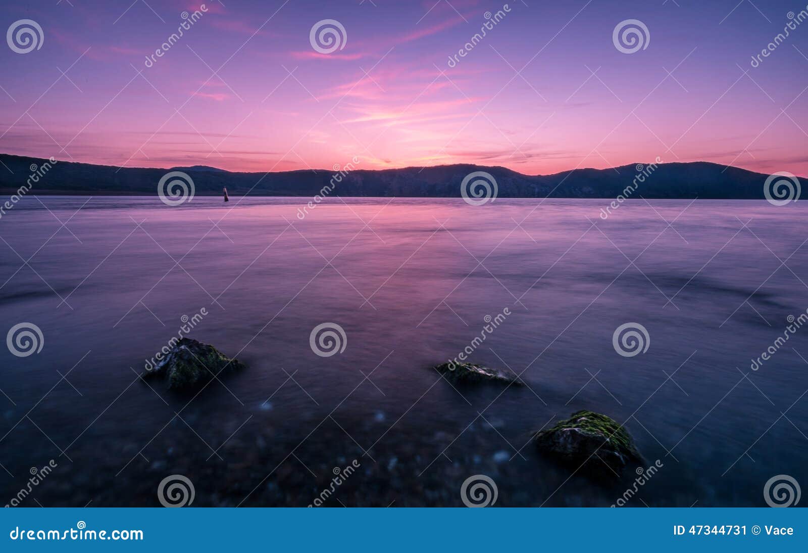 Calm seascape at sunset stock image. Image of outdoors - 47344731