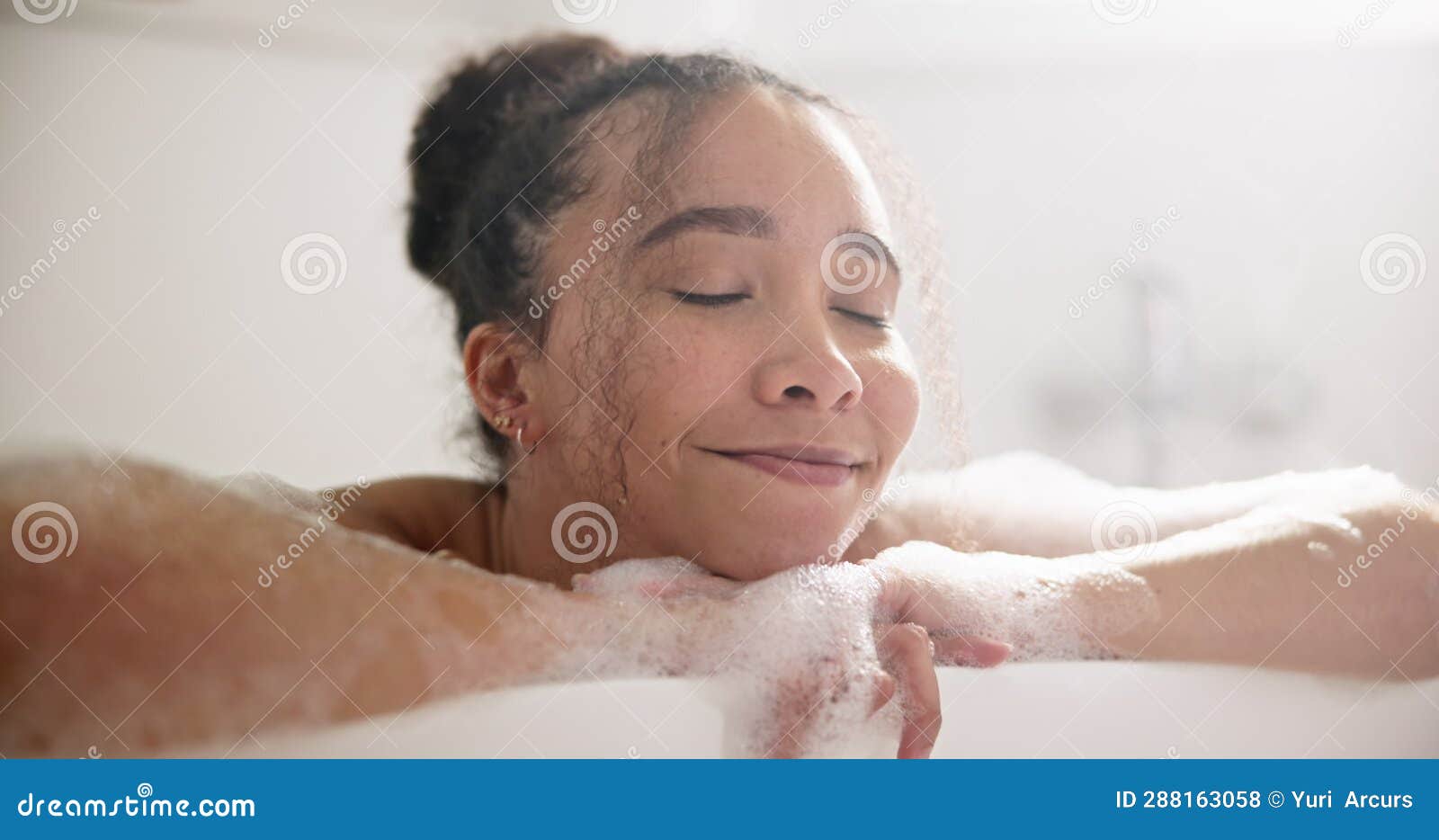 Calm Smile And Woman In A Bubble Bath At Her Home With A Zen Wellness