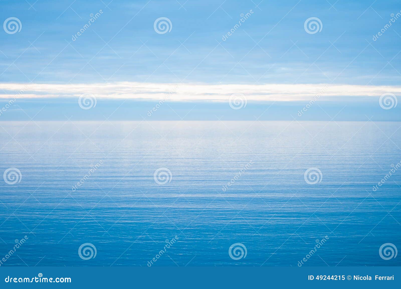 Calm and Still Open Sea Blurring into a Blue Sky Stock Image - Image of ...