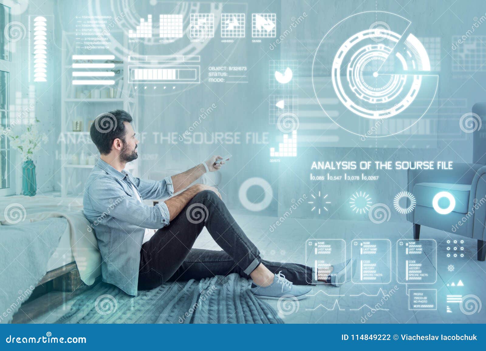 Calm Translator Sitting on the Floor and Switching Channels Stock Photo ...