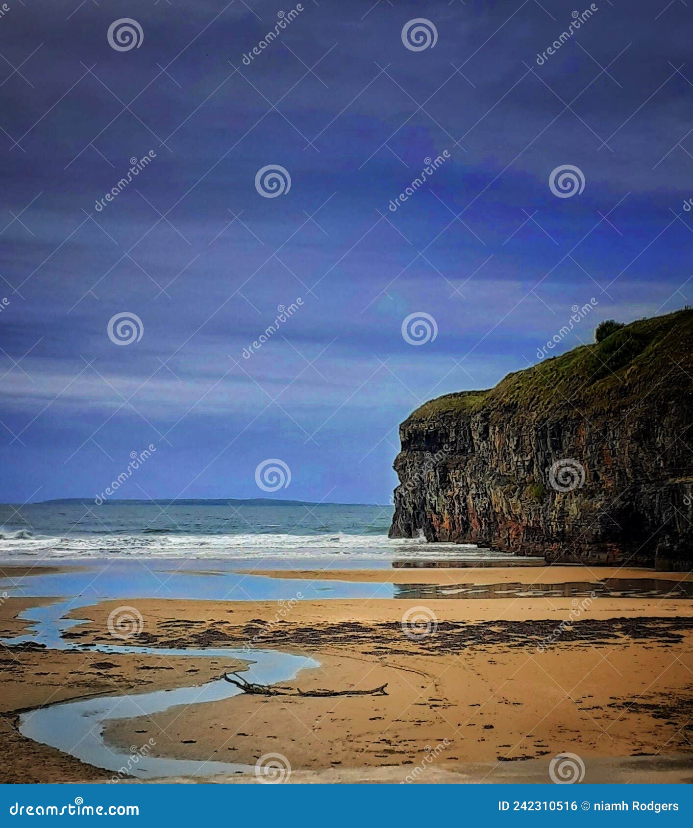 Calming, cliff beach stock photo. Image of ocean, horizon - 242310516