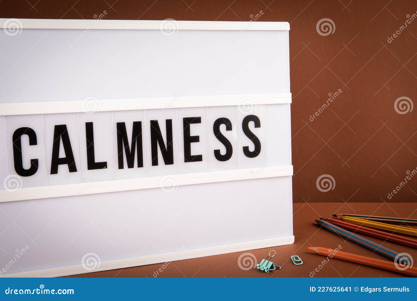 Calmness. Light Box with Text on a Brown Background Stock Image - Image ...