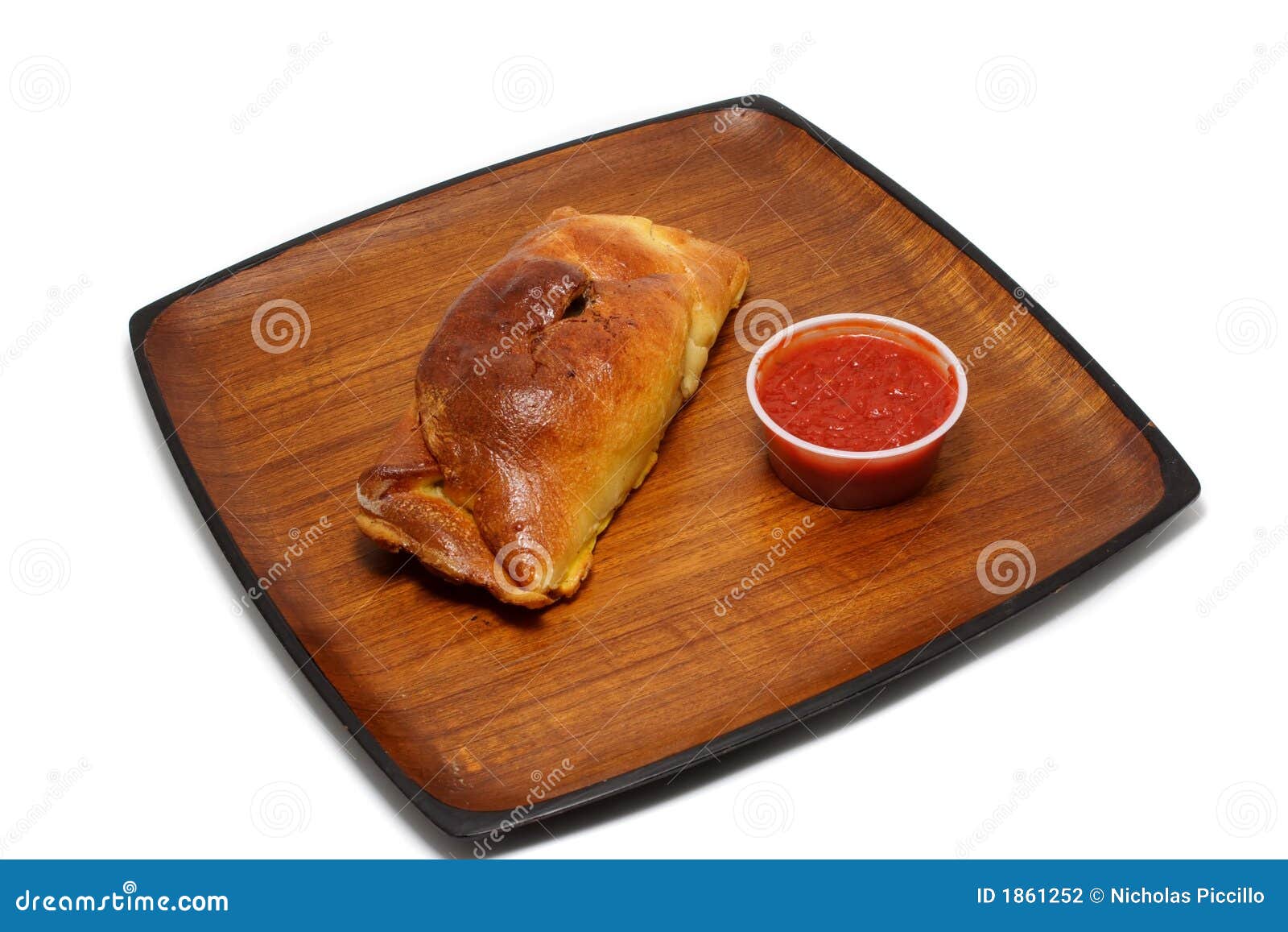 Calzone with Sauce stock photo. Image of tray, white, sauce - 1861252