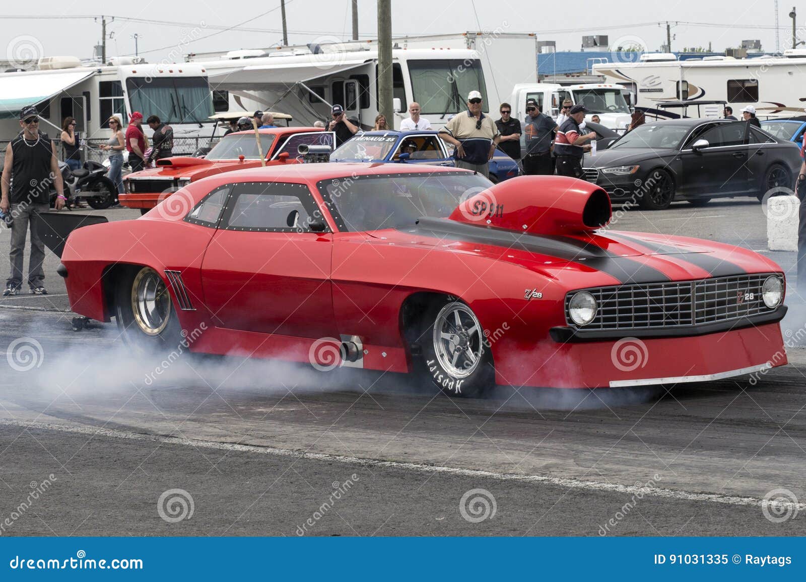 Camaro drag car in action editorial image. Image of dragway - 91031335