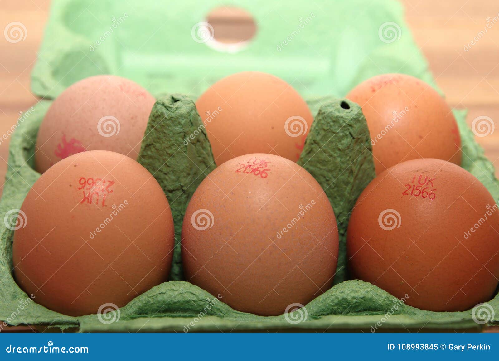 Camberley, UK - Dec 31 2016: Brown Eggs in Green Box with British Egg ...