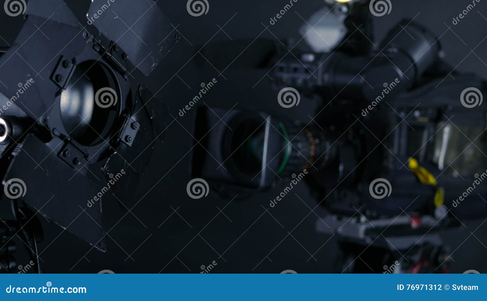 Camcorder, Video Camera and Professional Studio Lights in a ...