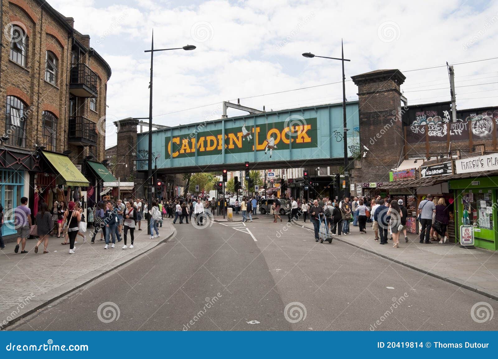 Camden Lock With Shops In The Background And A Small Number Of People ...