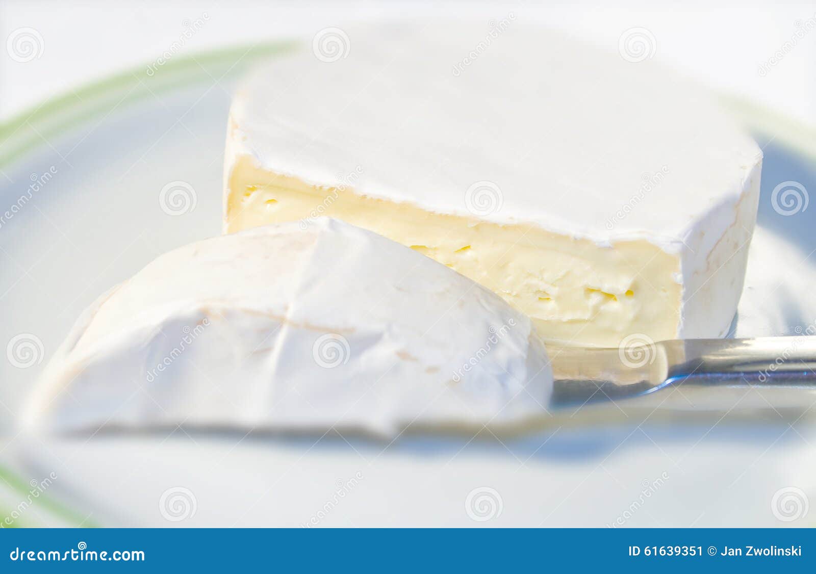 Camembert cheese on plate stock image. Image of knife - 61639351