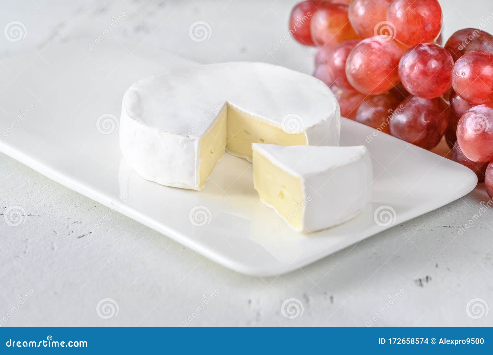 Camembert on the Serving Plate Stock Photo - Image of grape, gourmet ...