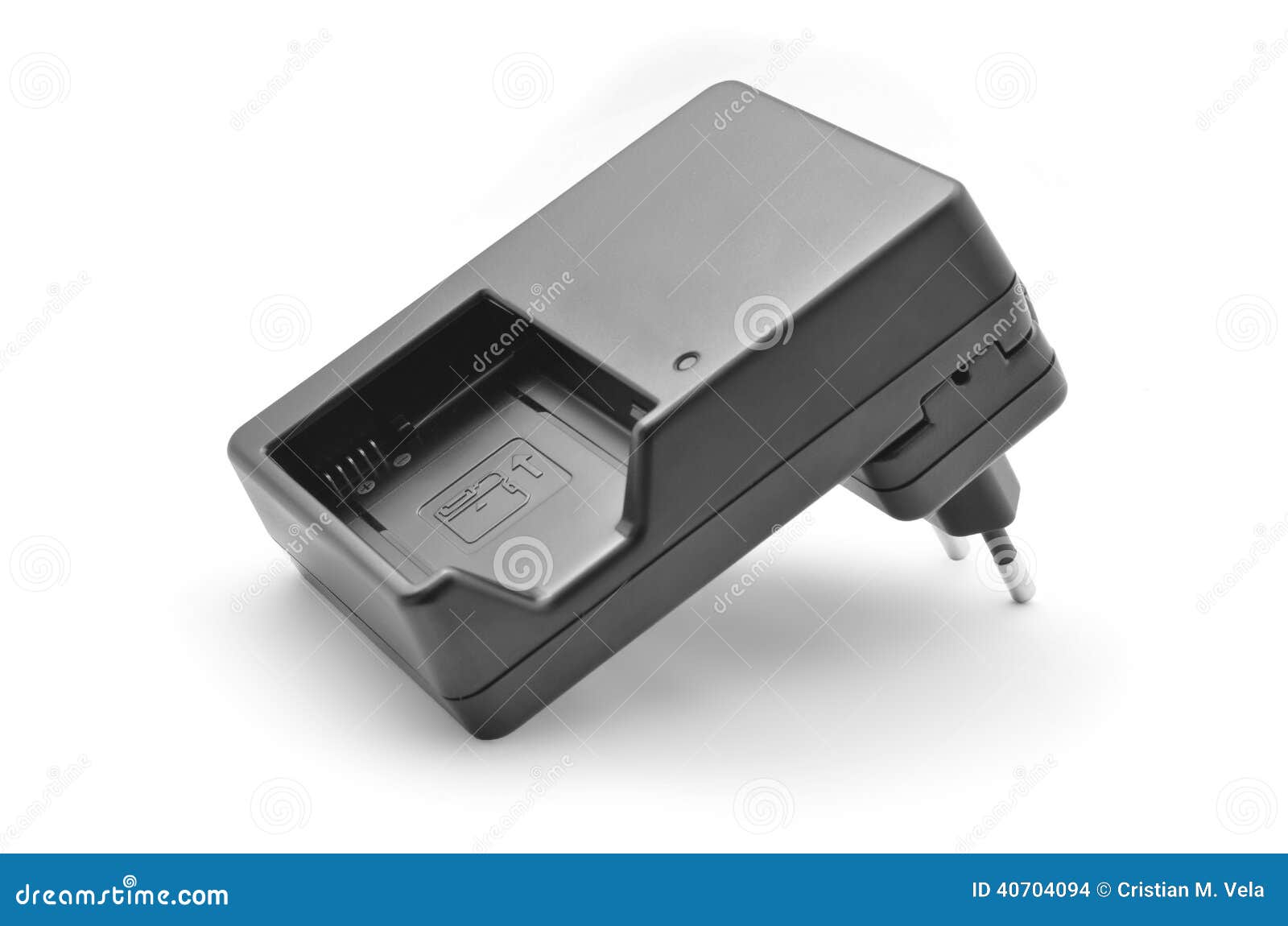 Camera battery charger stock photo. Image of device, accumulator - 40704094