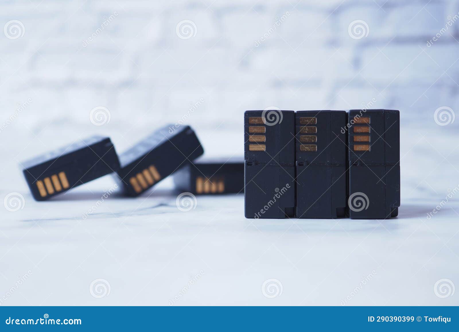 Camera Batteries on a Table , Stock Image - Image of supply, power ...