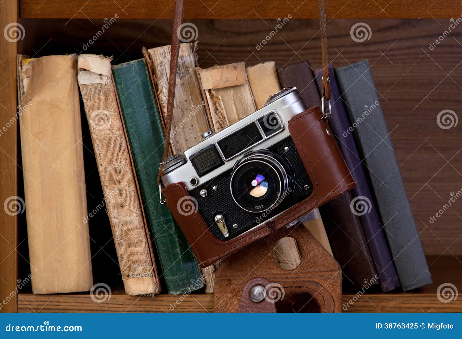 Camera and books stock image. Image of antique, prose - 38763425