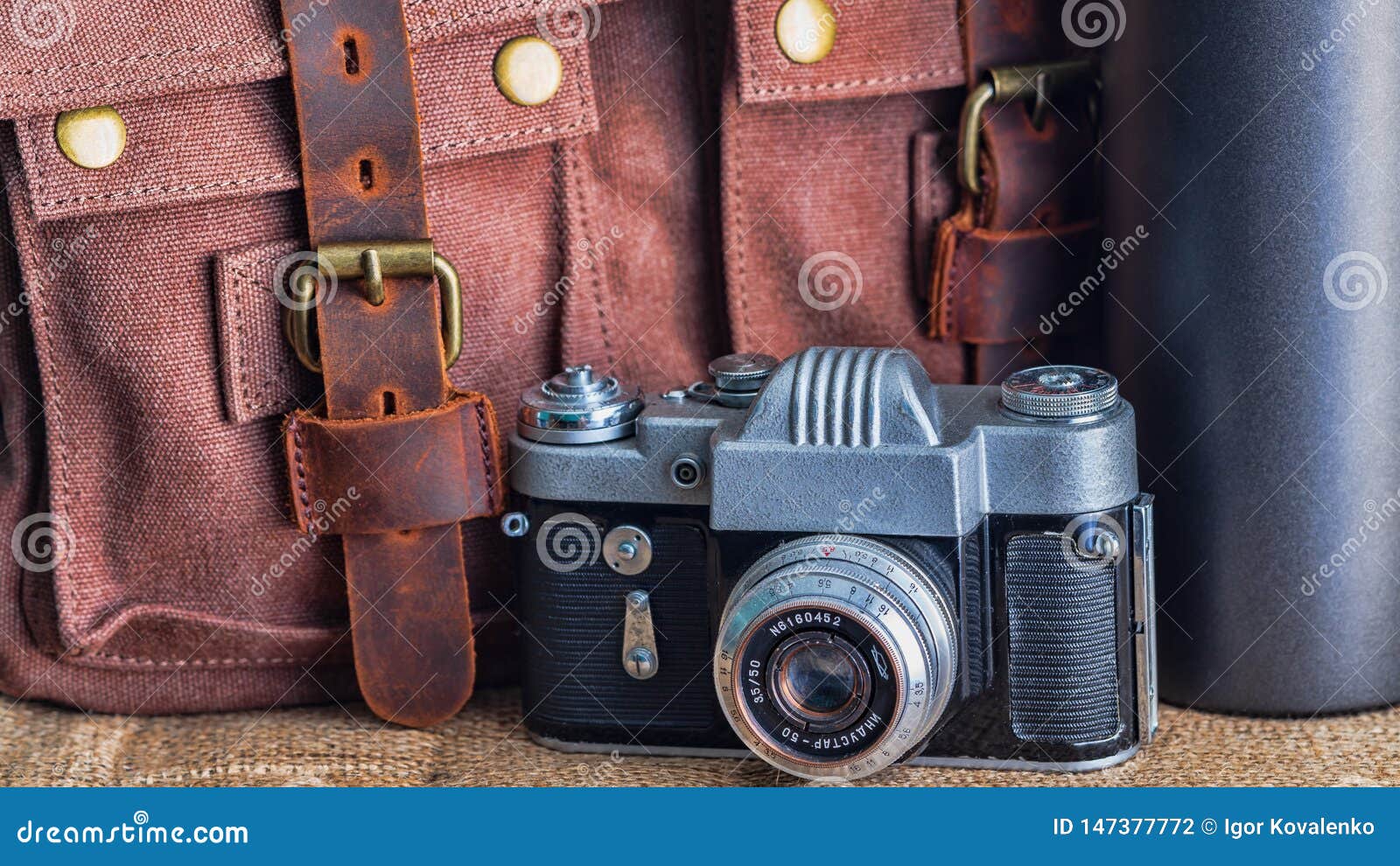 Camera and Briefcase on the Table Stock Photo - Image of table, morning ...