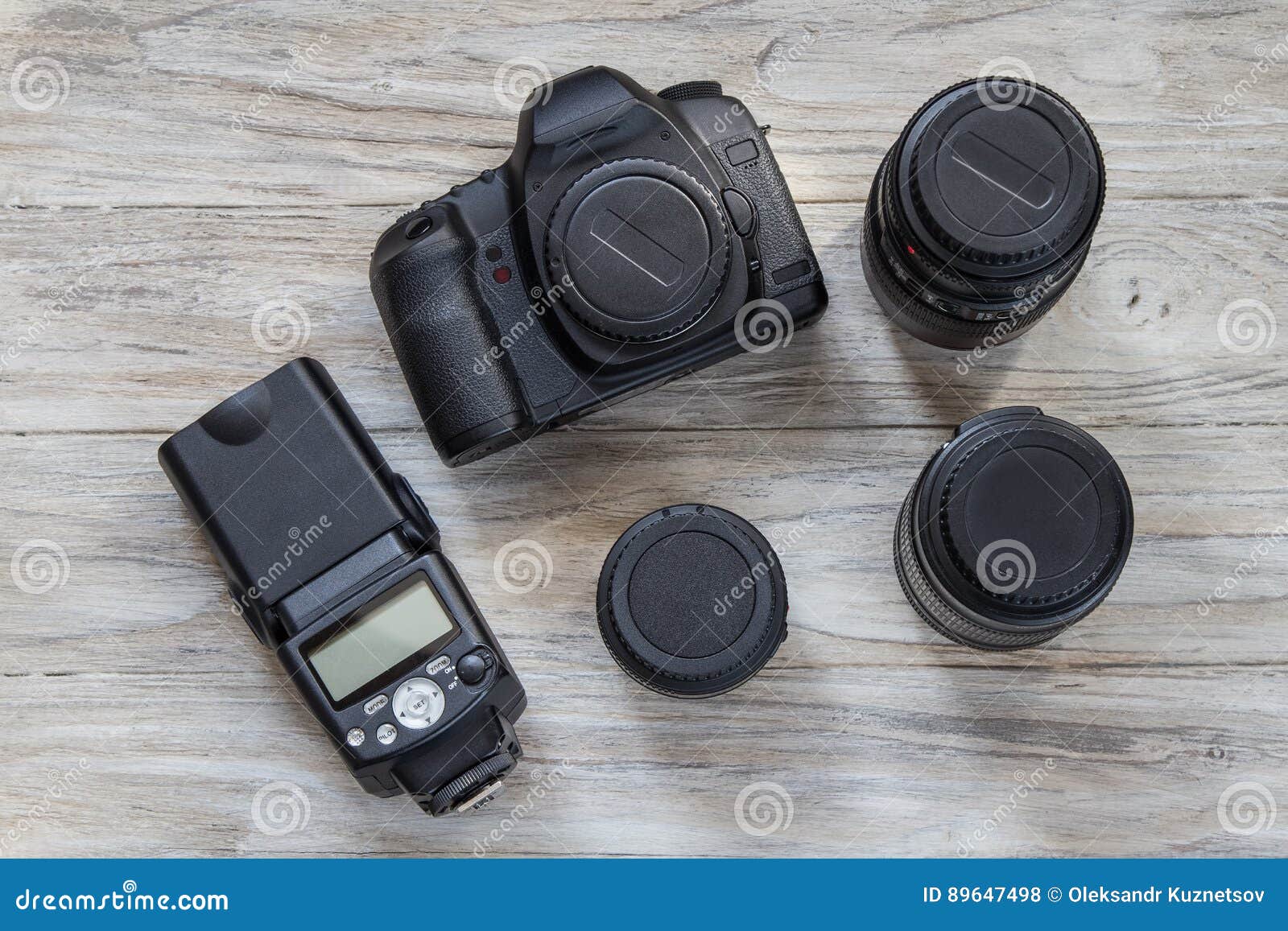 Camera and Camera Lens on a Wooden Background, Top View Stock Photo ...