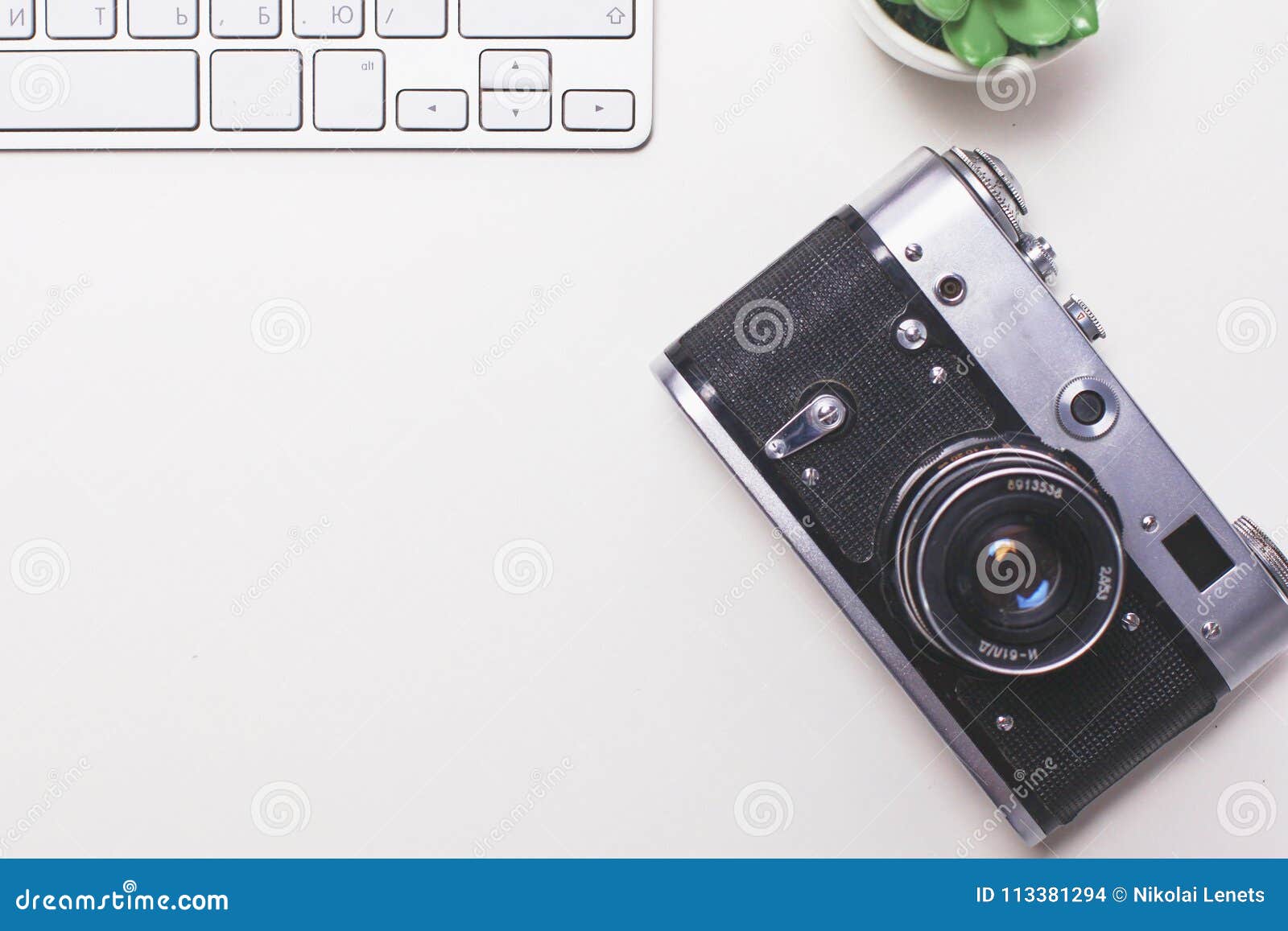 Camera and Computer Keyboard on the Desktop Stock Photo - Image of ...