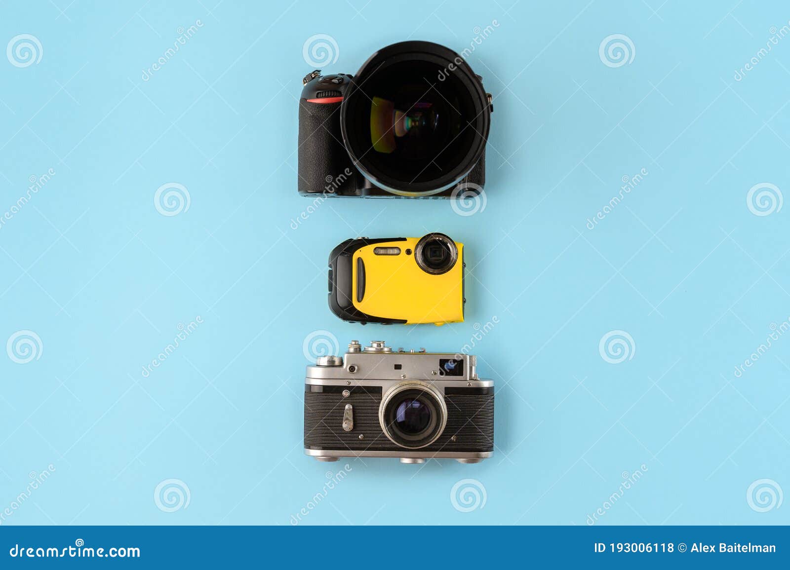 Camera Evolution.Cameras of Different Types and Generations on a Blue ...