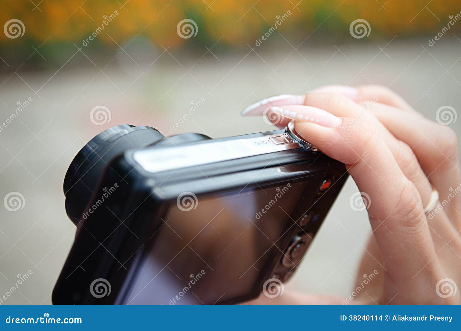 Camera in a female hand stock photo. Image of hand, advertising - 38240114