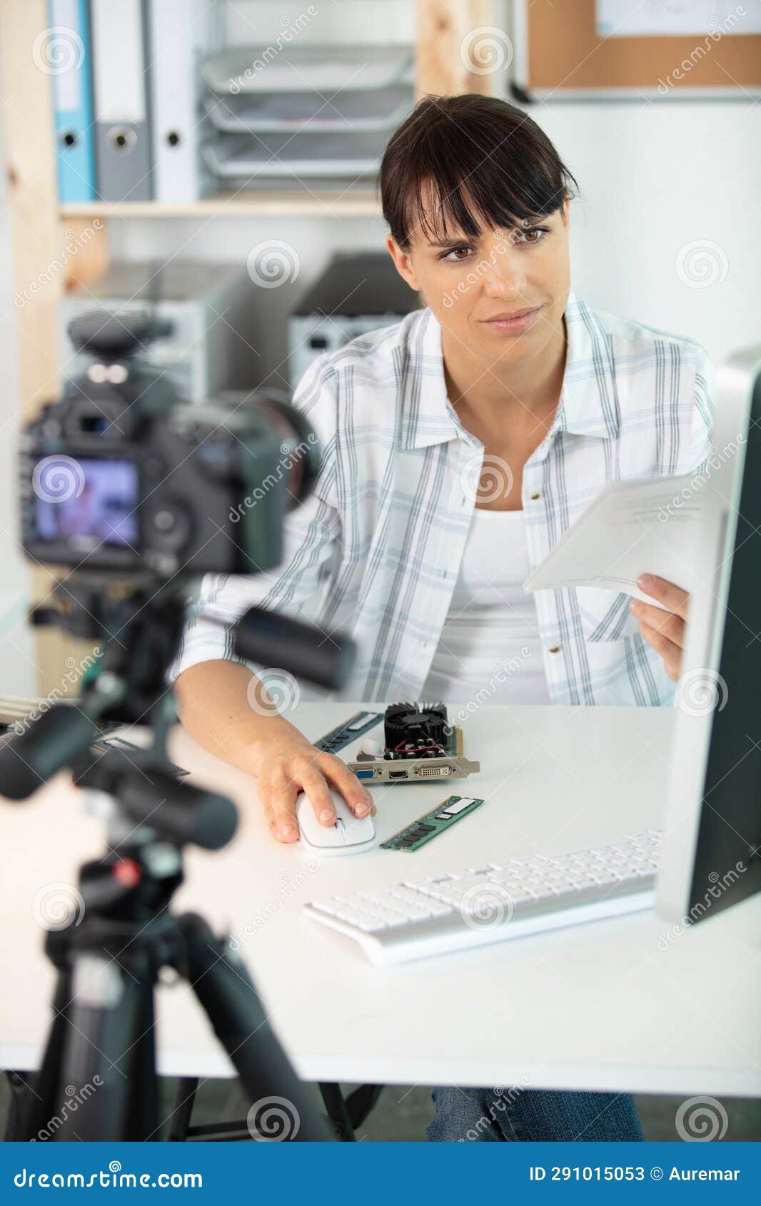 Camera Filming Woman at Desk Using Computer Stock Image - Image of ...