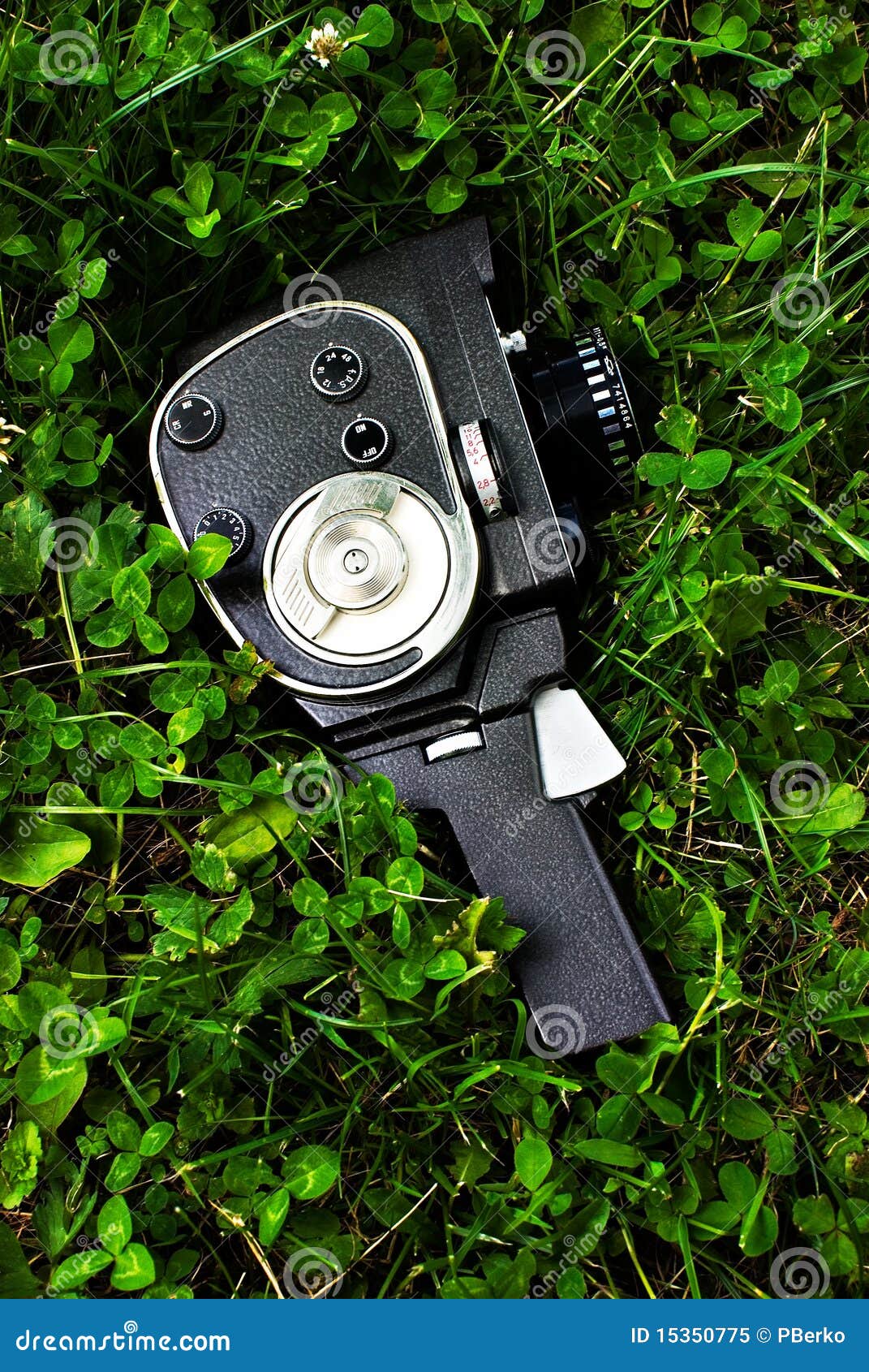 Camera on grass stock image. Image of outdoor, handle - 15350775