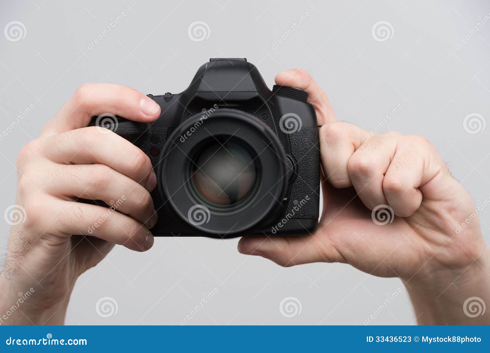 Camera in hands. stock image. Image of caucasian, studio - 33436523