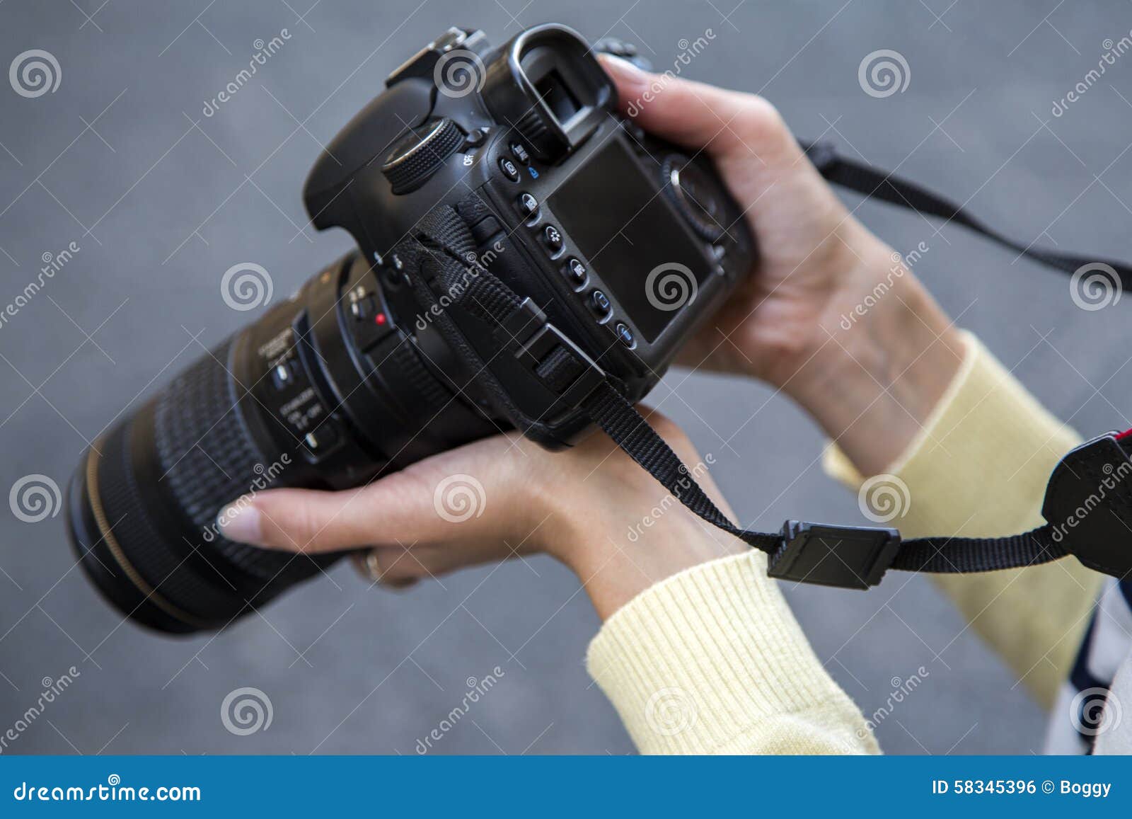 Camera in the hands stock photo. Image of hands, travel - 58345396