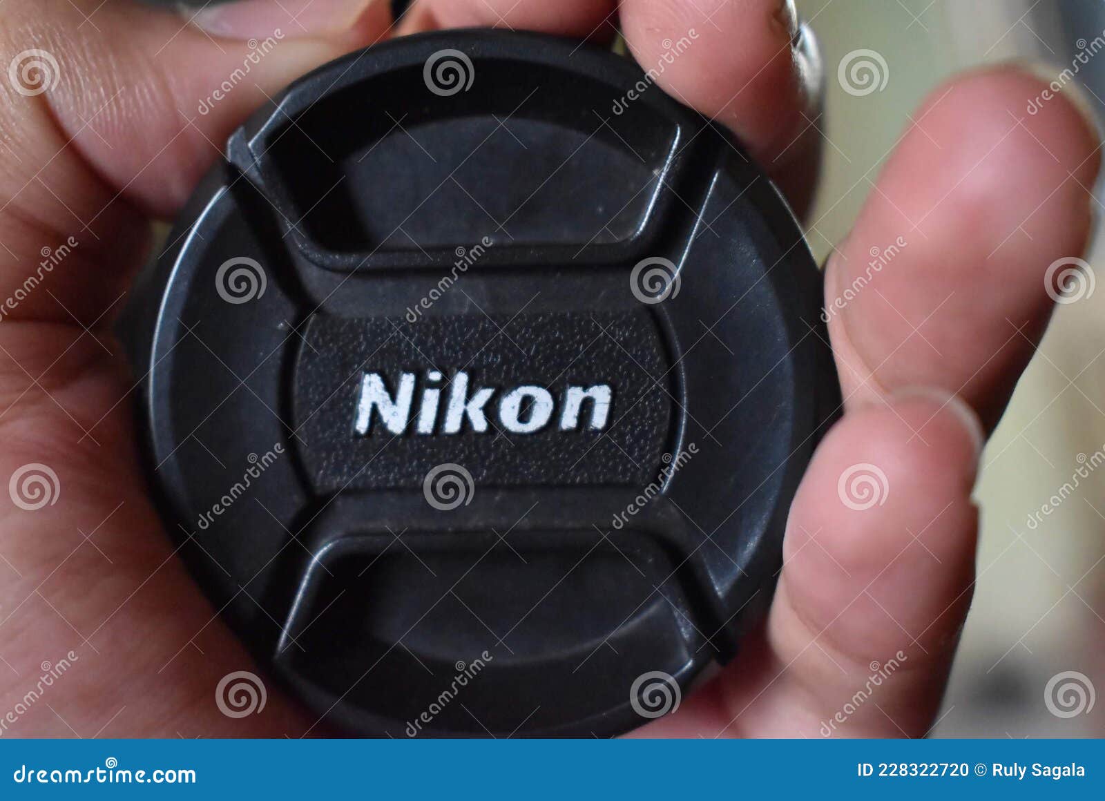 Camera lens cap editorial image. Image of hand, camera - 228322720