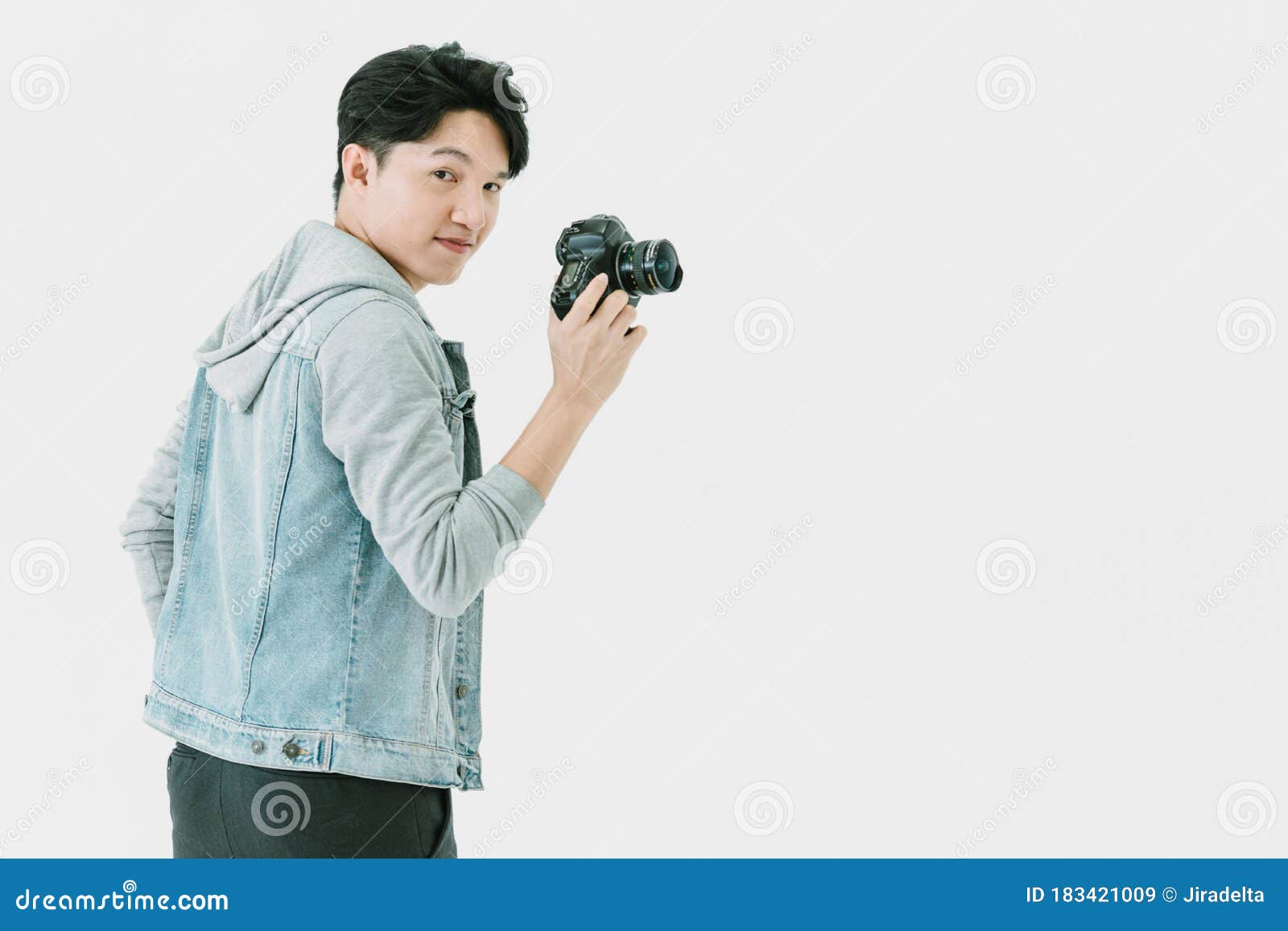 Asian Camera Man Holding Camera with Hand and Looking Back To Smile ...