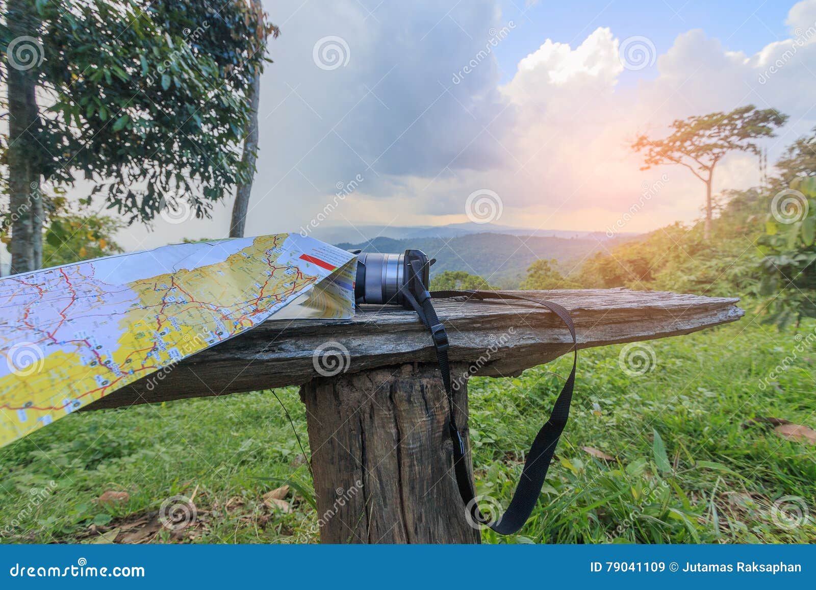 Camera and Map on Bench with Landscape Background Stock Image - Image ...