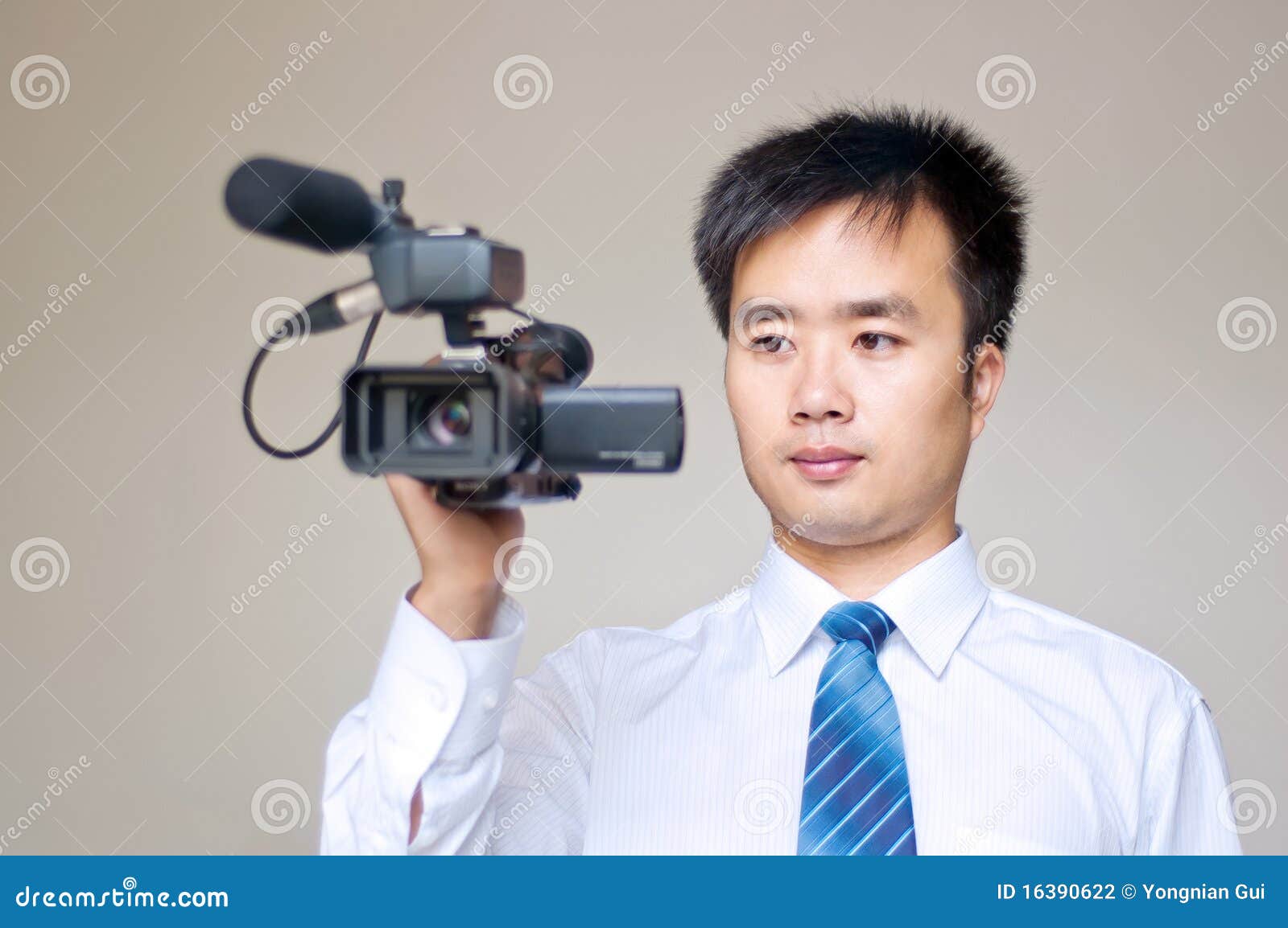 Camera and men stock photo. Image of tape, male, shot - 16390622