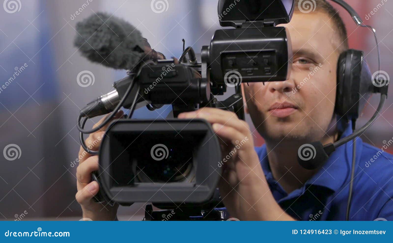 Camera Operator Working with a Cinema Broadcast TV Camera Stock Video ...