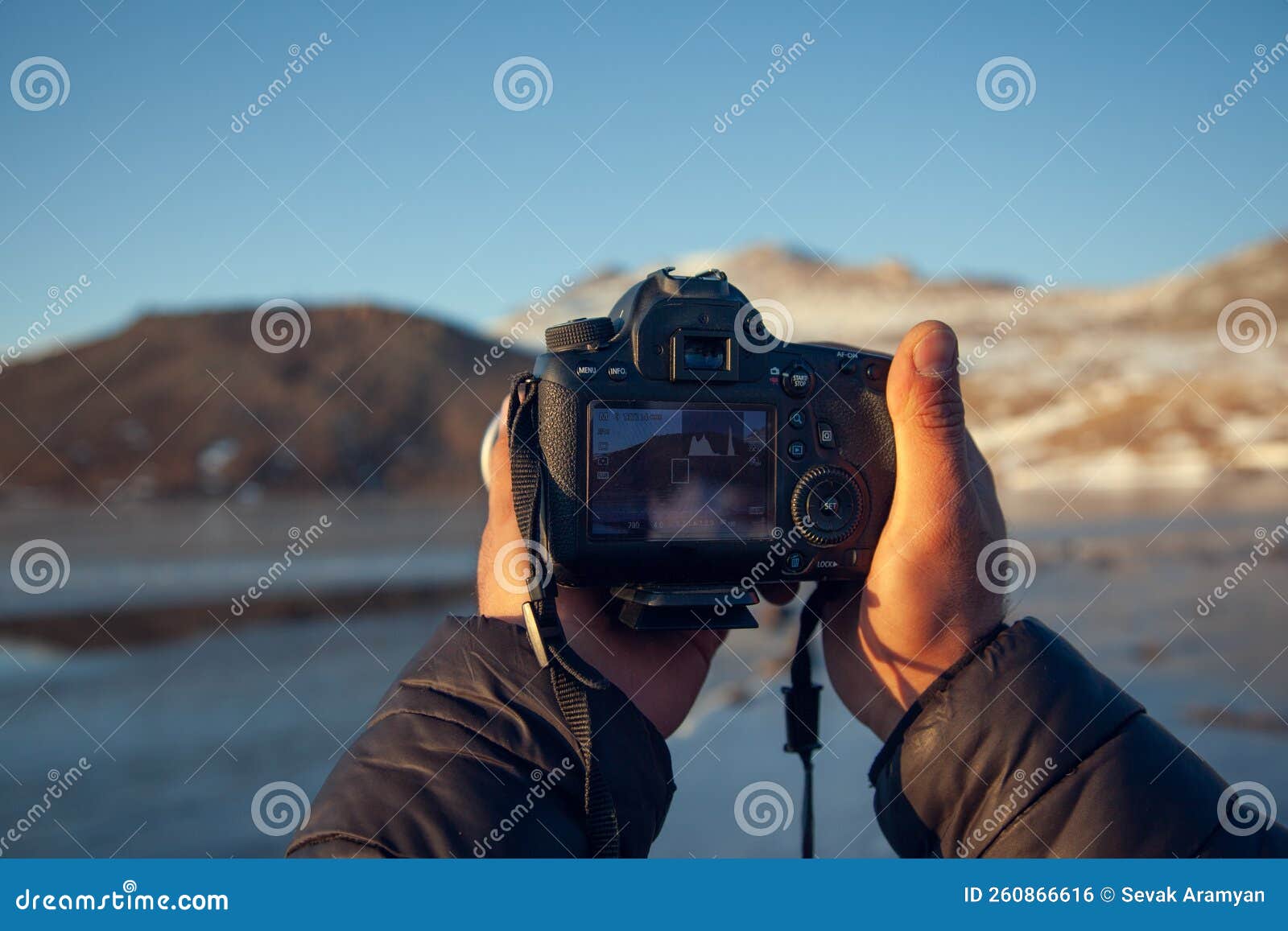 Camera in the Photographer Hand Stock Photo - Image of hand, equipment ...