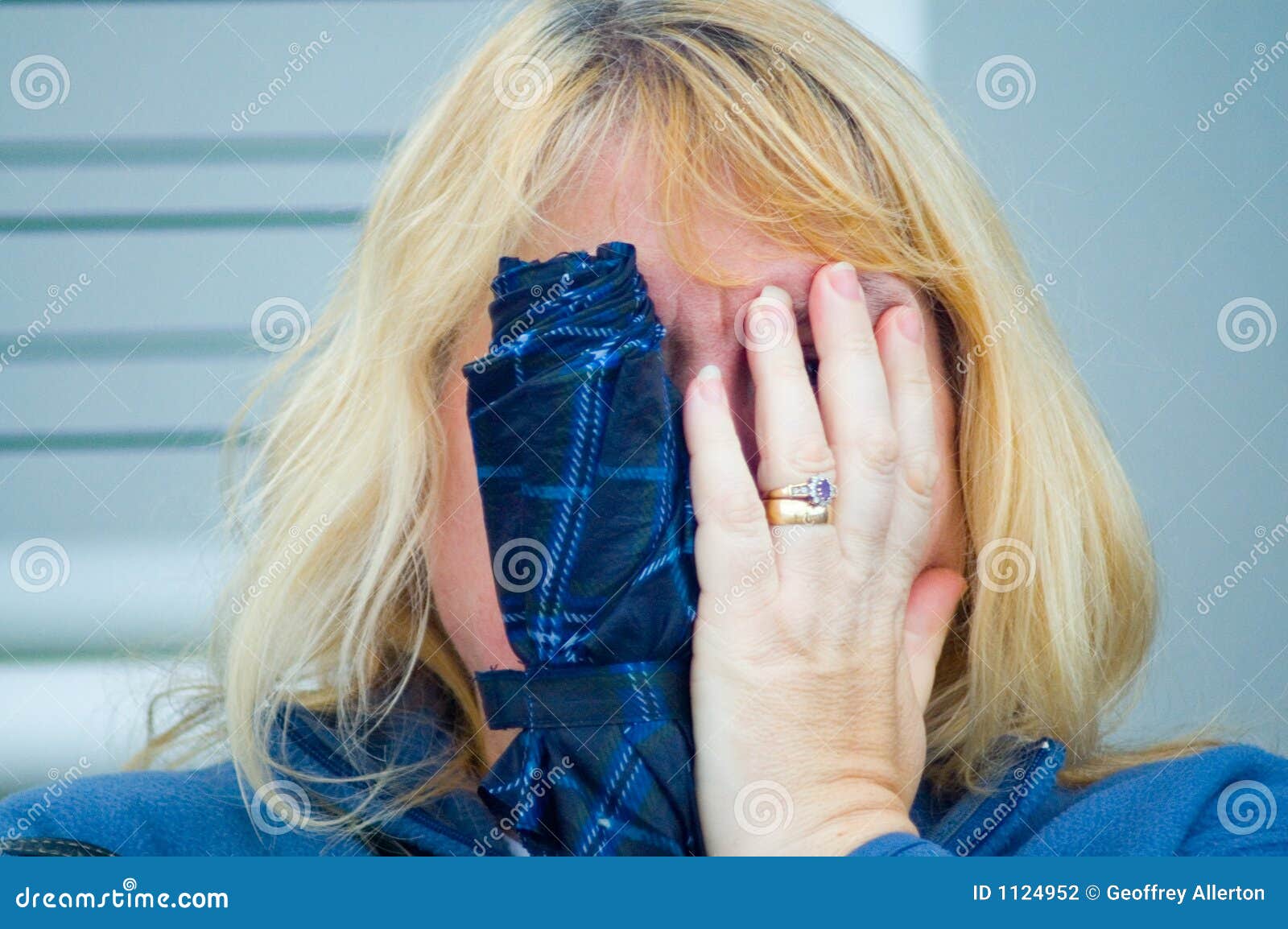 Camera shy blonde stock photo. Image of portrait, female - 1124952