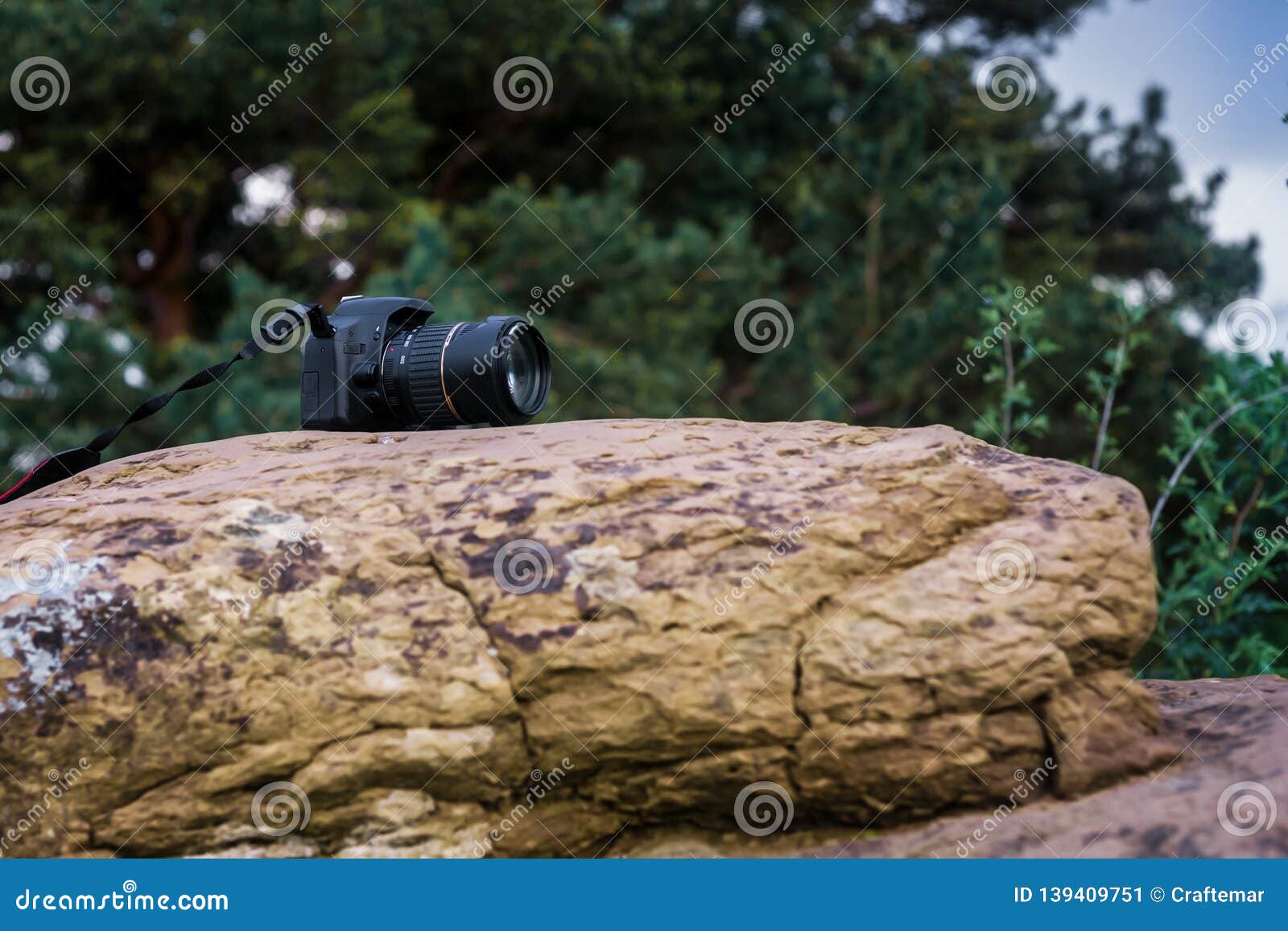 Camera on the stone stock image. Image of tree, equipment - 139409751