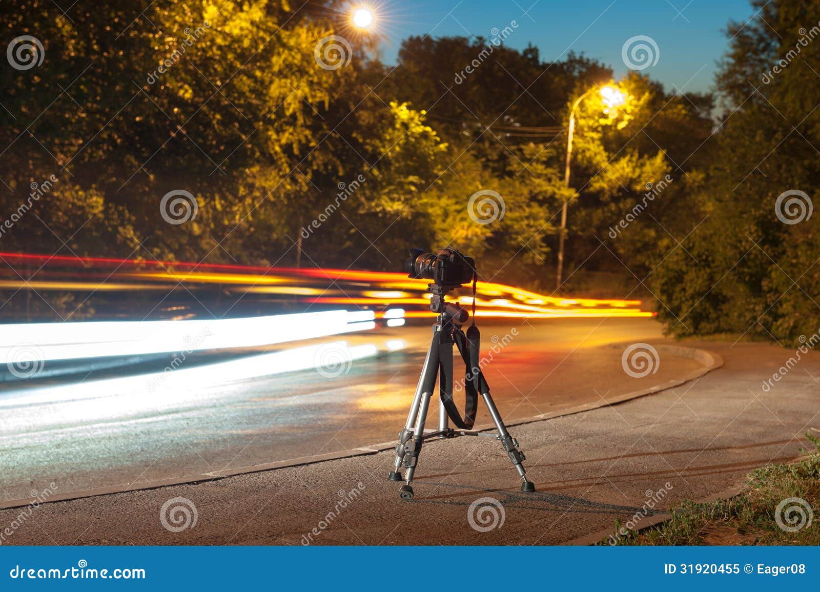 Camera on tripod at night stock image. Image of movement - 31920455