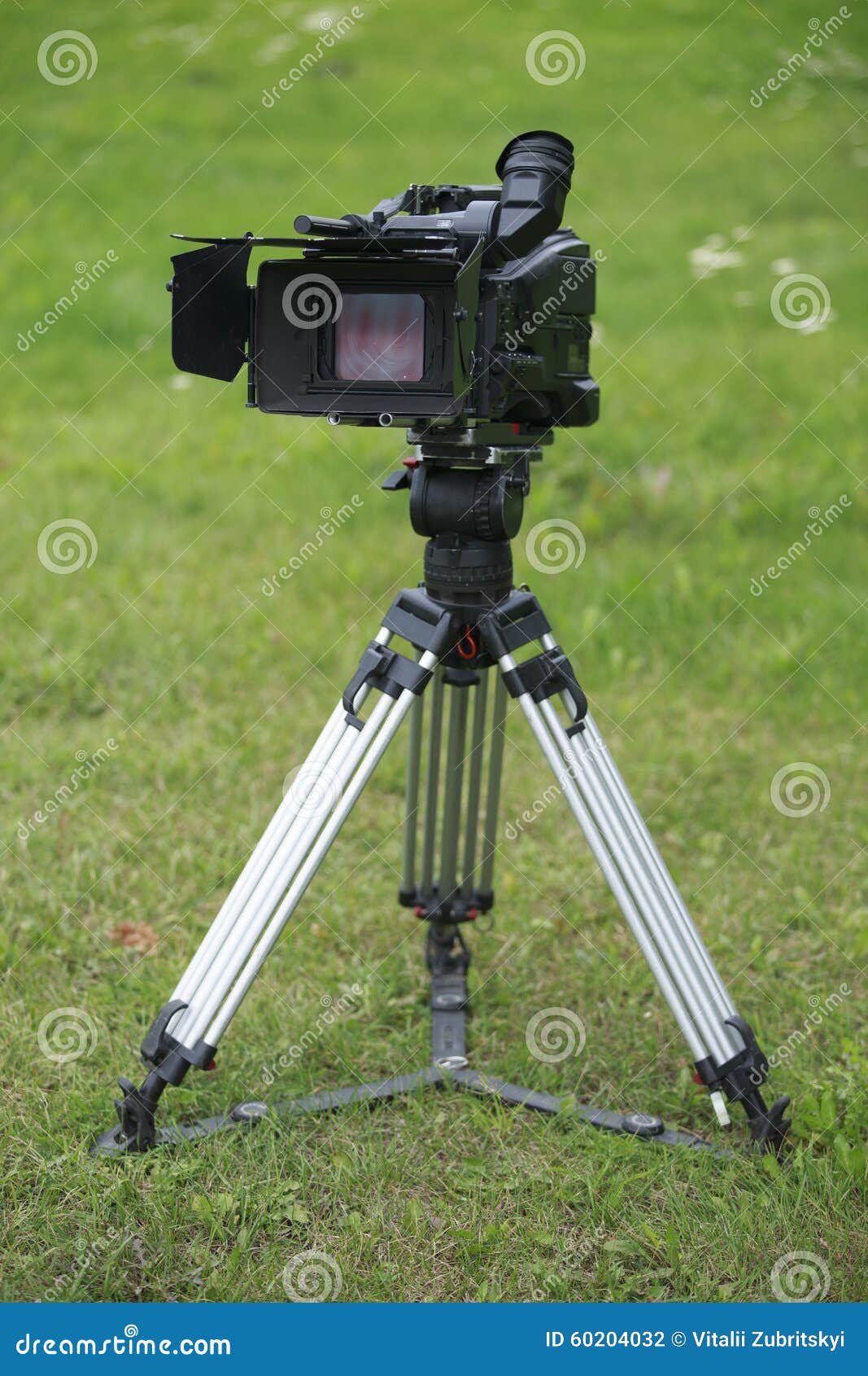 Camera on tripod stock photo. Image of stand, meadow - 60204032