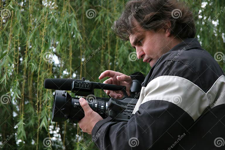 Cameraman stock photo. Image of outdoors, hand, filming - 5355476