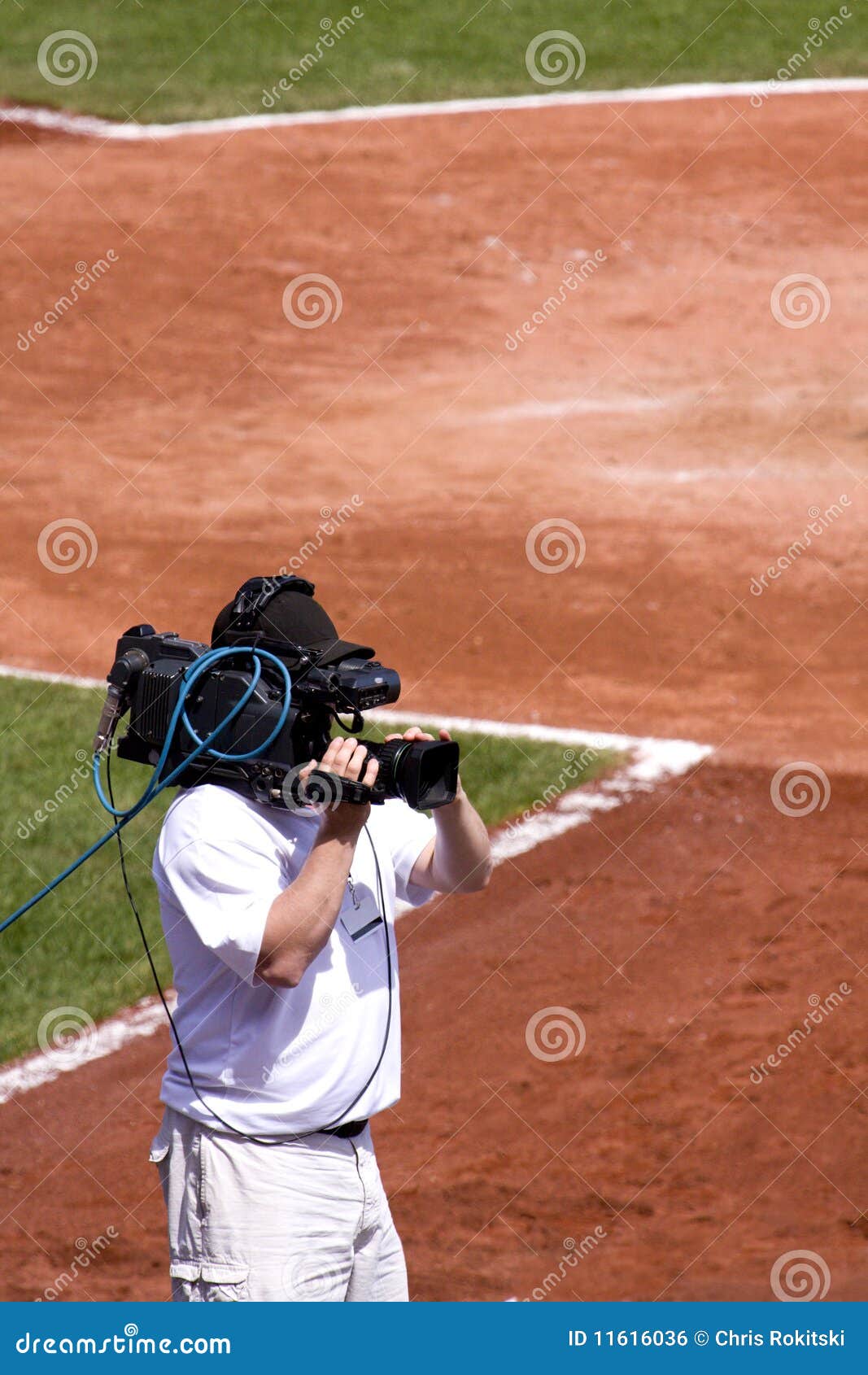 Cameraman on Baseball Field Stock Photo - Image of outside, vertical ...