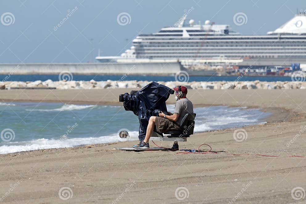 Cameraman at the beach editorial photo. Image of malaga - 19696336