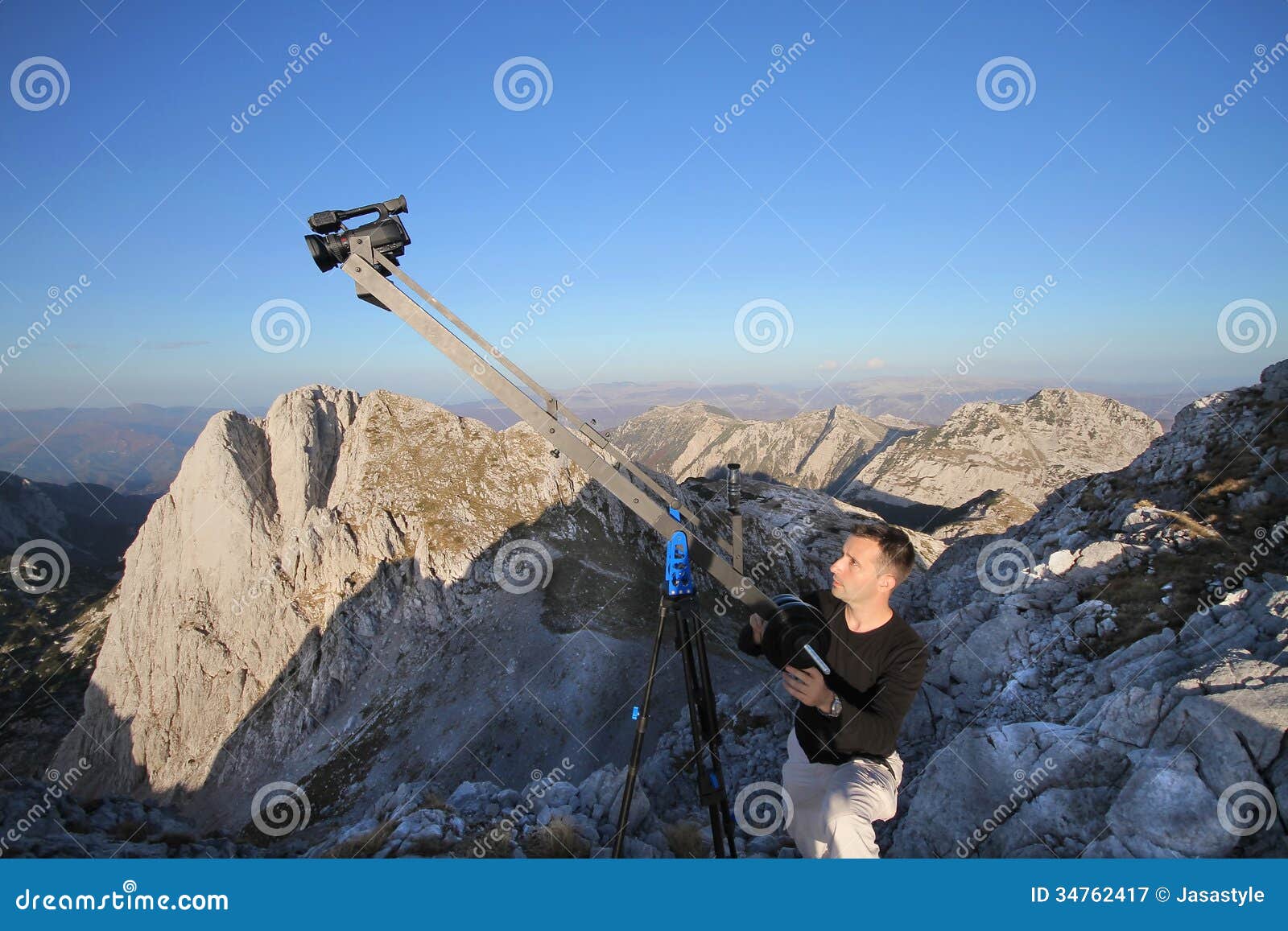 Cameraman on mountain stock image. Image of couple, hill - 34762417