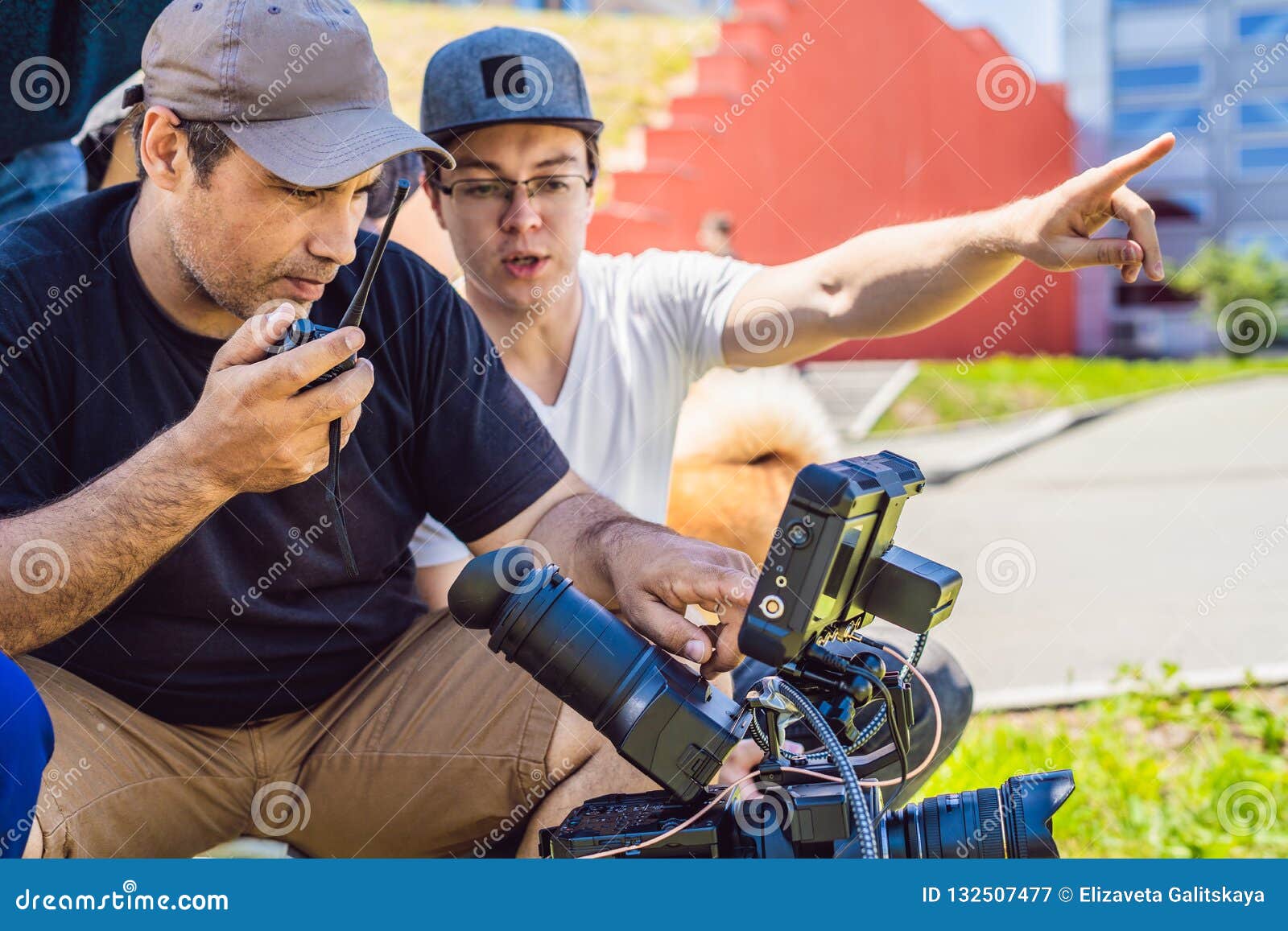 A Cameraman Operator Discuss the Shooting Process with a Director and ...