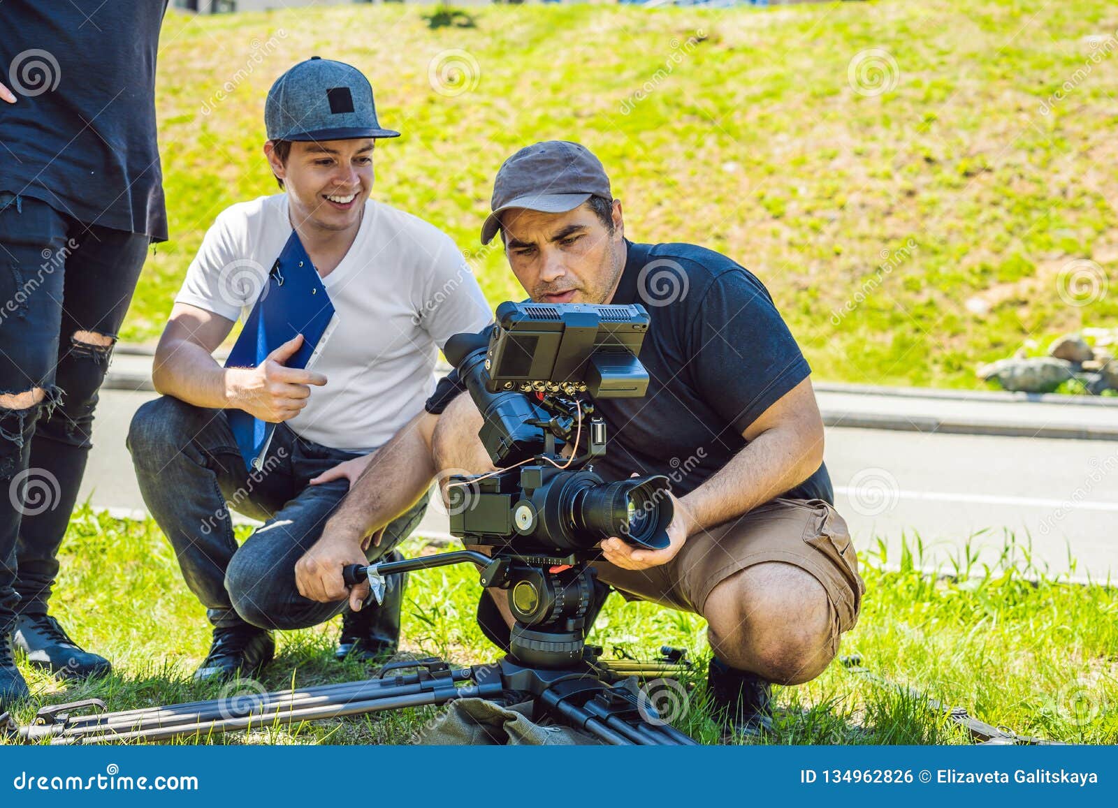 A Cameraman Operator Discuss the Shooting Process with a Director and ...