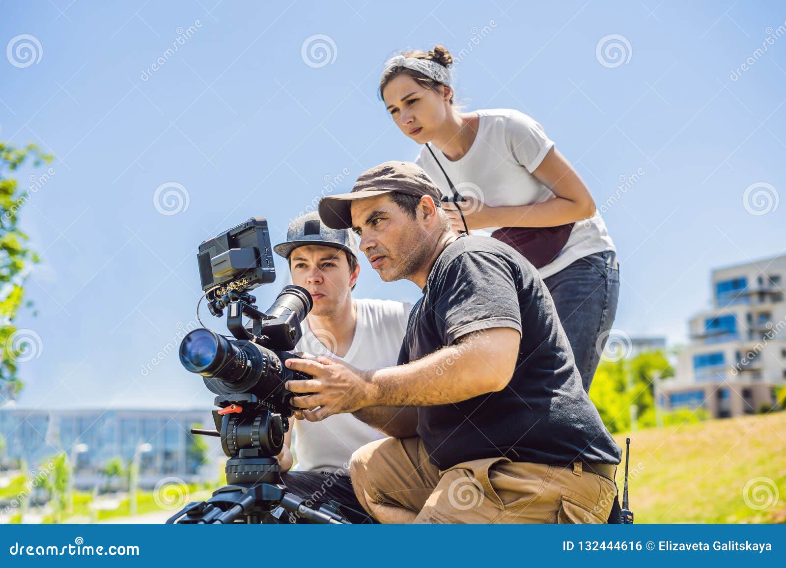 A Cameraman Operator Discuss the Shooting Process with a Director and ...