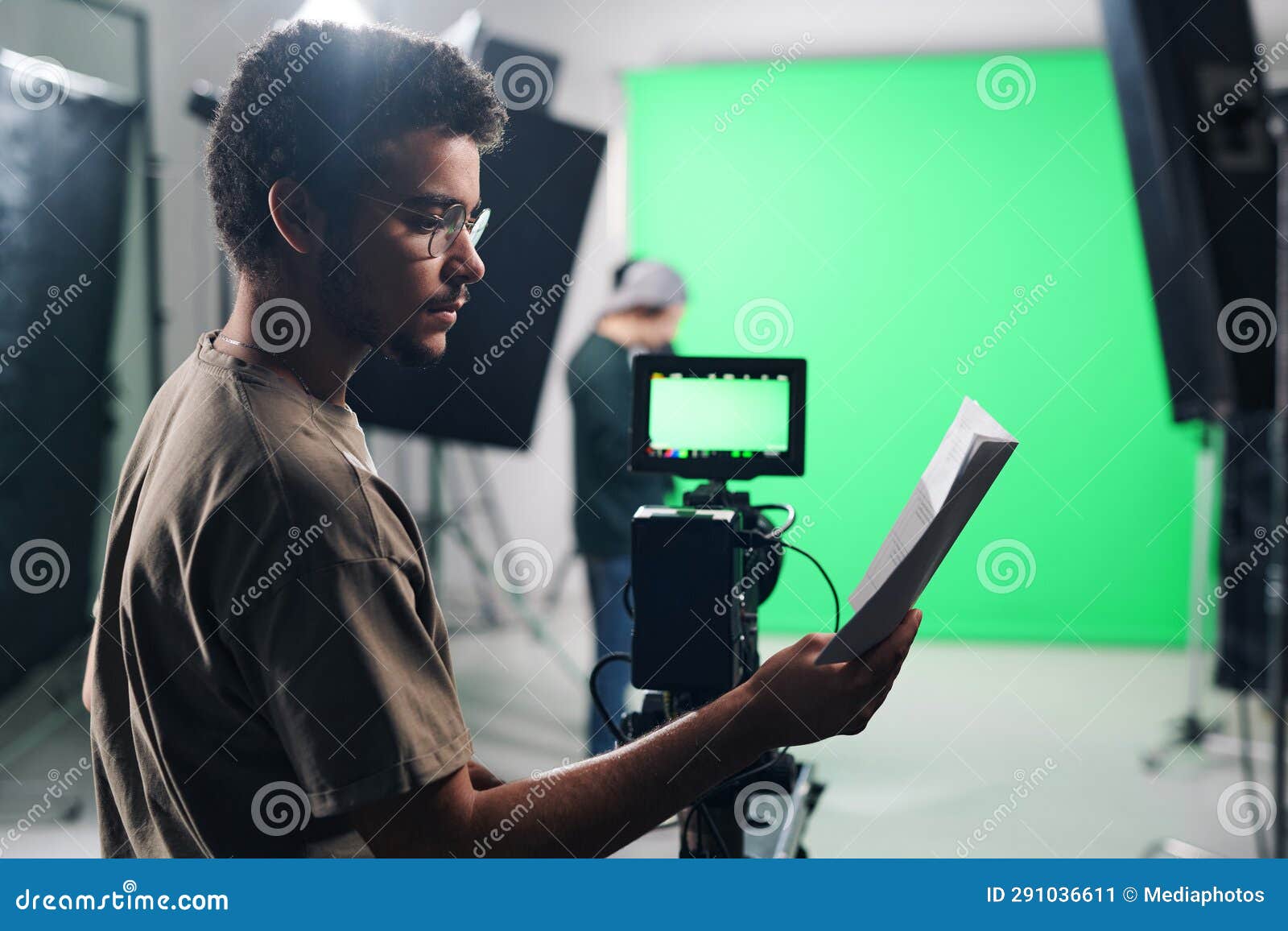 Cameraman Reading Script before Shooting Stock Image - Image of ...