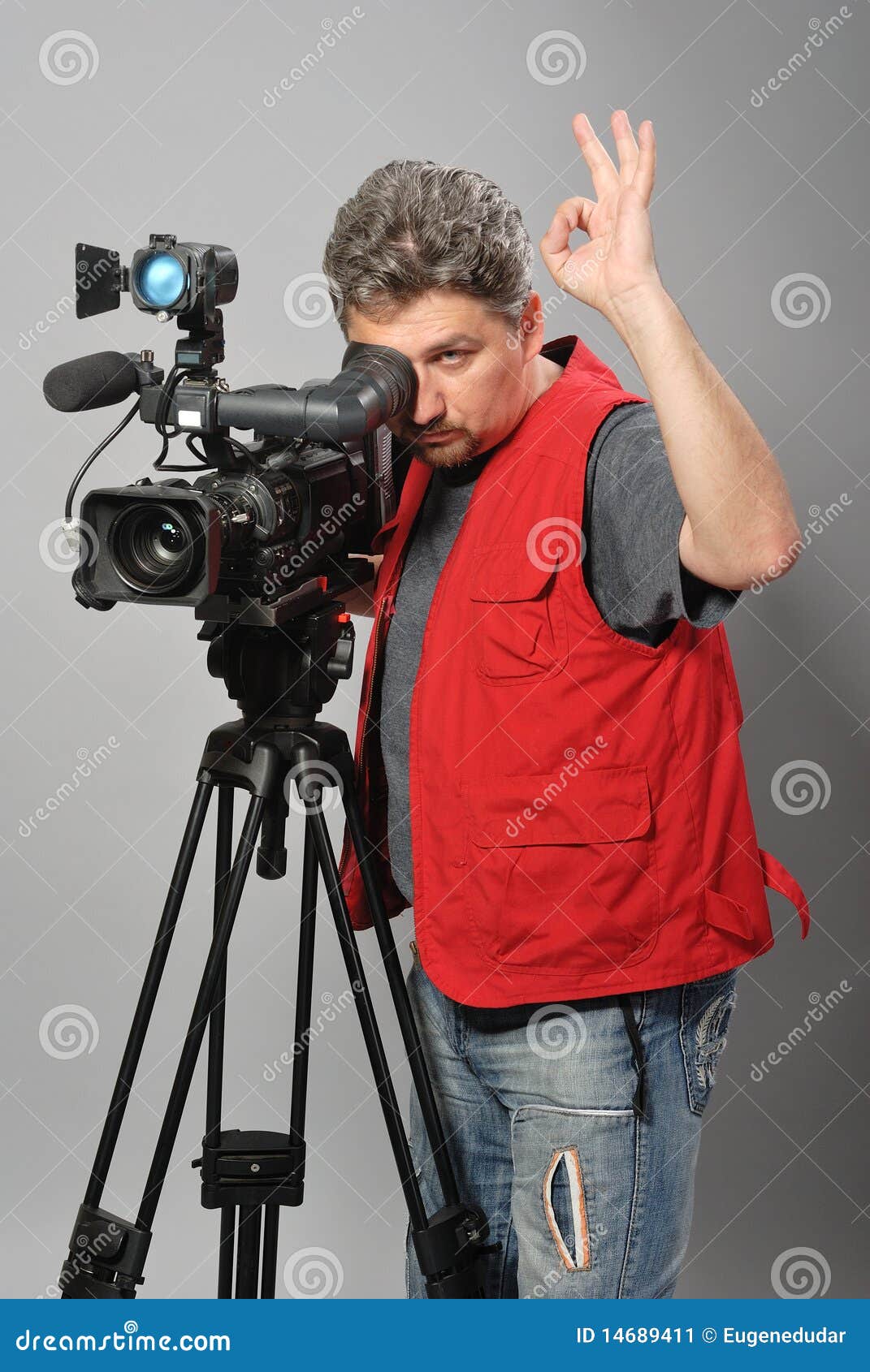 Cameraman in red vest stock image. Image of isolated - 14689411