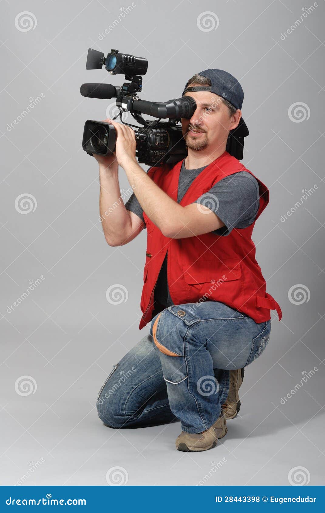 Cameraman in red vest stock photo. Image of occupation - 28443398
