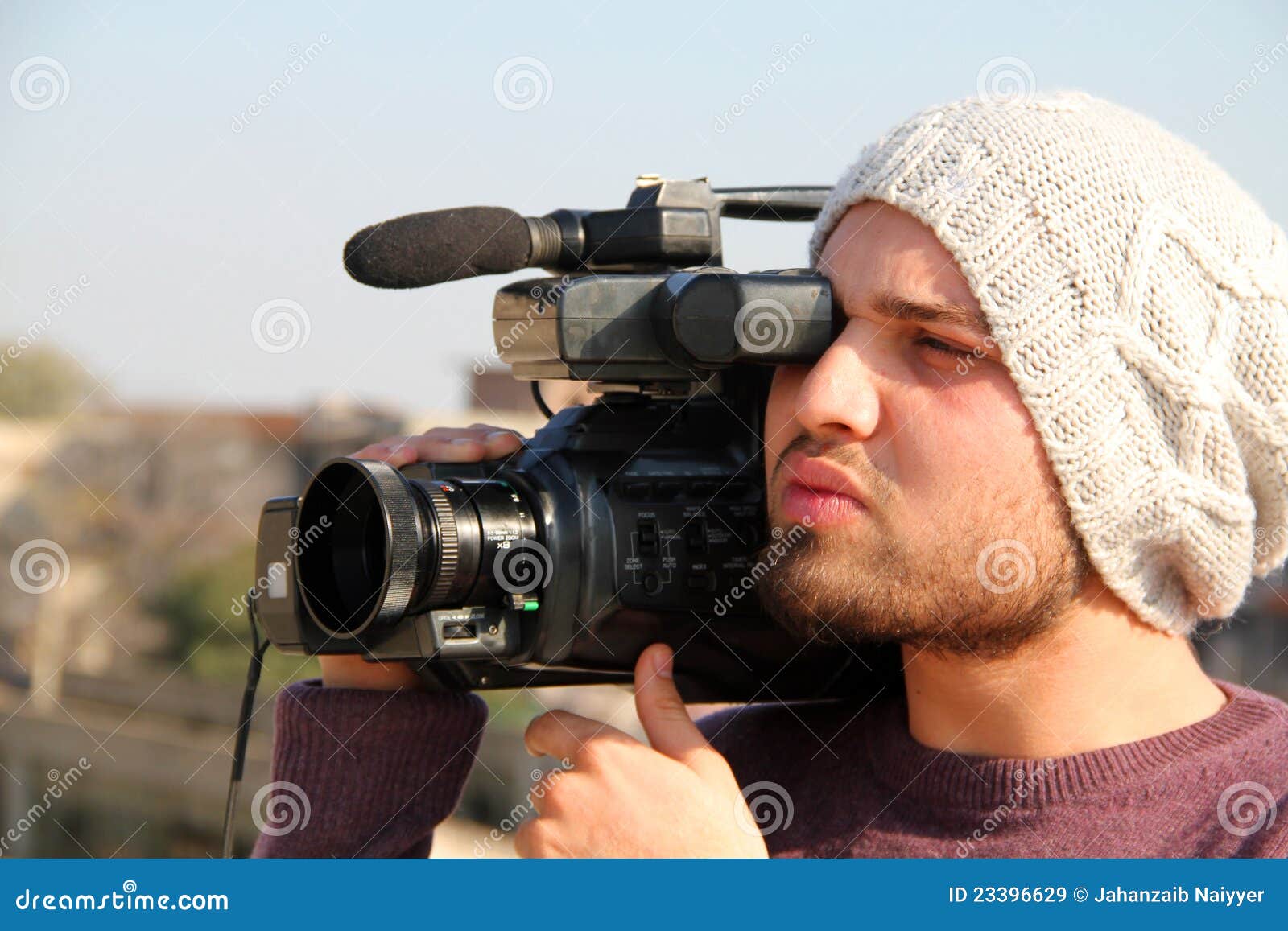 Cameraman Shooting stock image. Image of lens, modern - 23396629