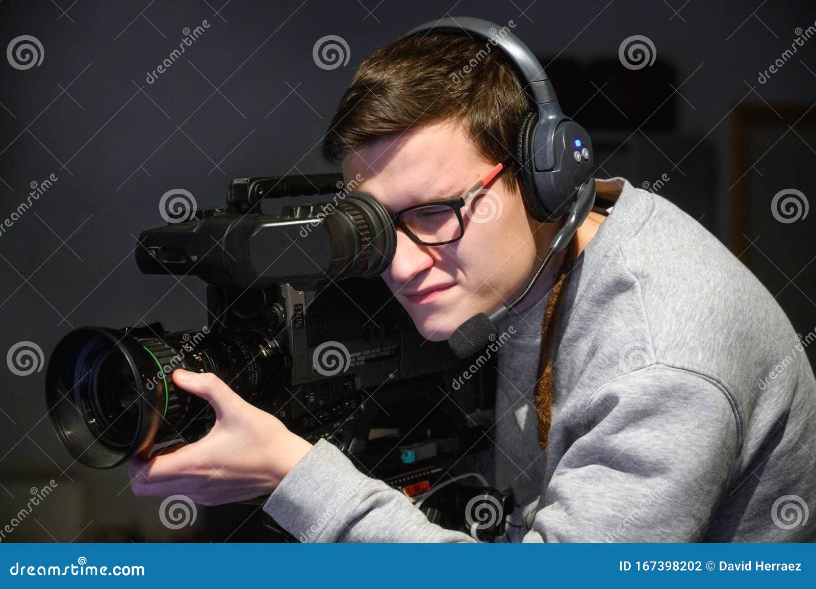 Cameraman Using Professional Digital Video Camera. Stock Photo - Image ...