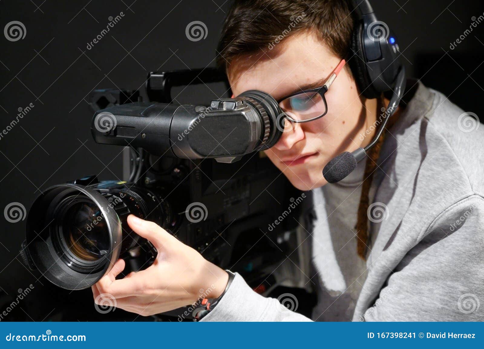 Cameraman Using Professional Digital Video Camera. Stock Image - Image ...