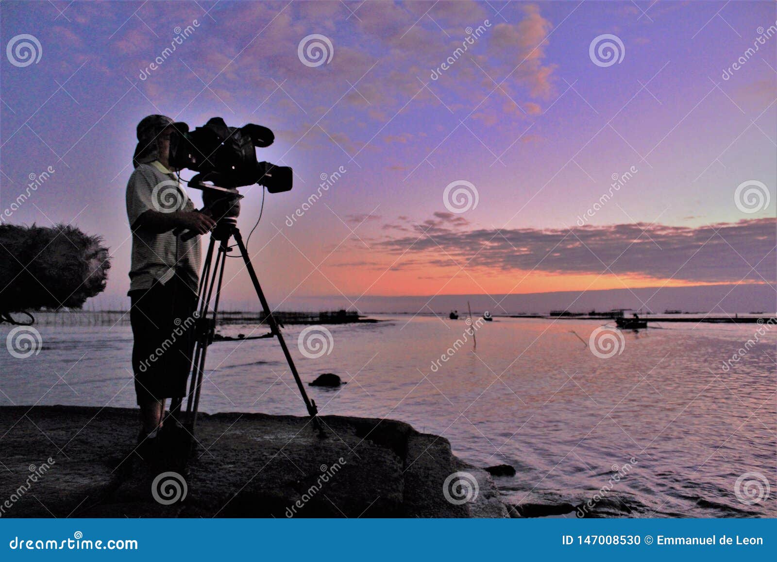 The cameraman at work stock photo. Image of seascape - 147008530
